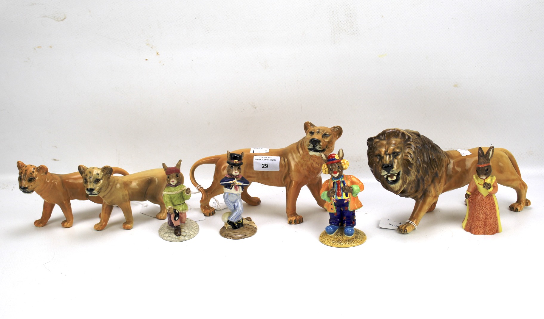 Four Beswick lions and four Royal Doulton Bunnykins figures. - auctions ...