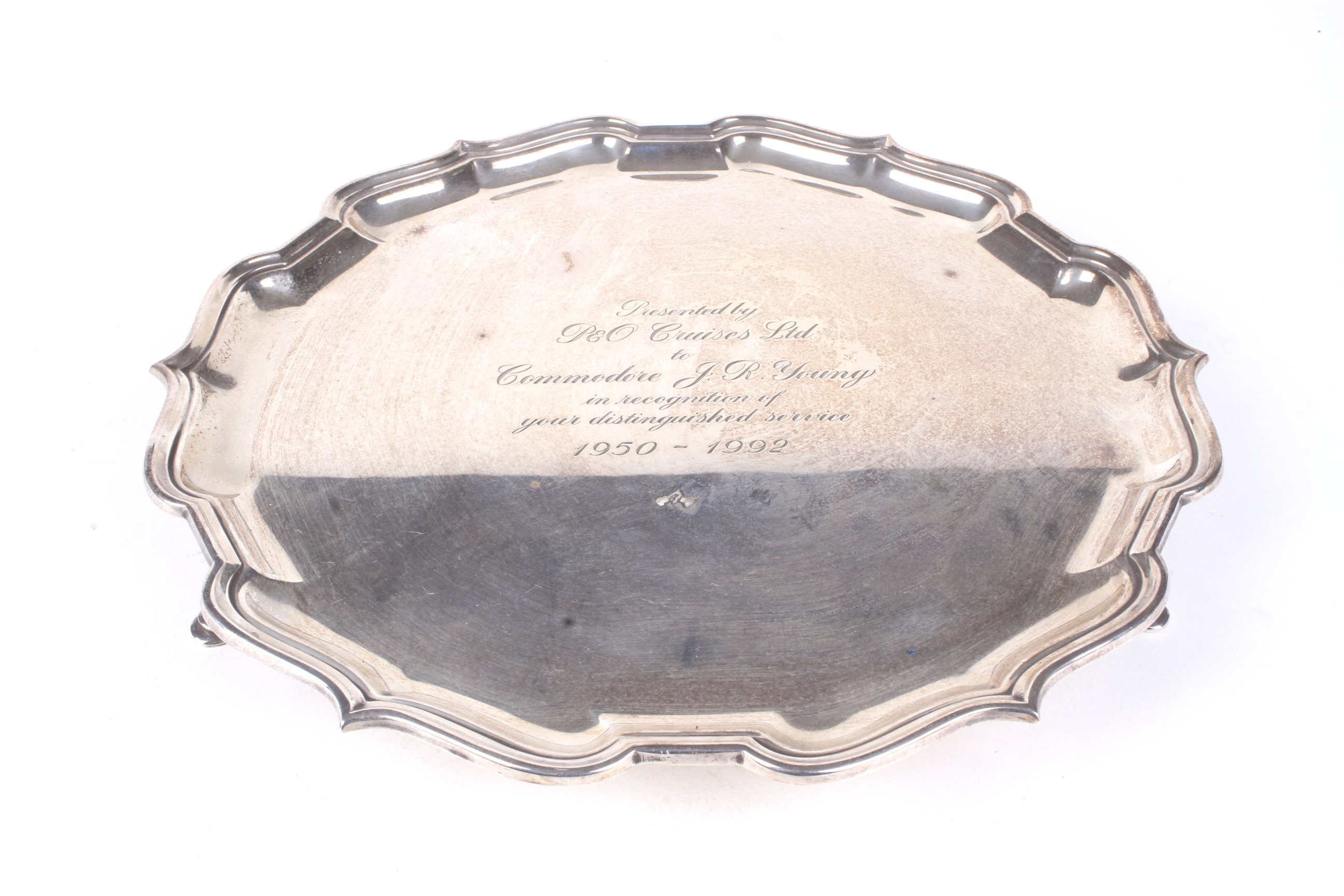 20th century silver presentation salver. With pie crust border and ...
