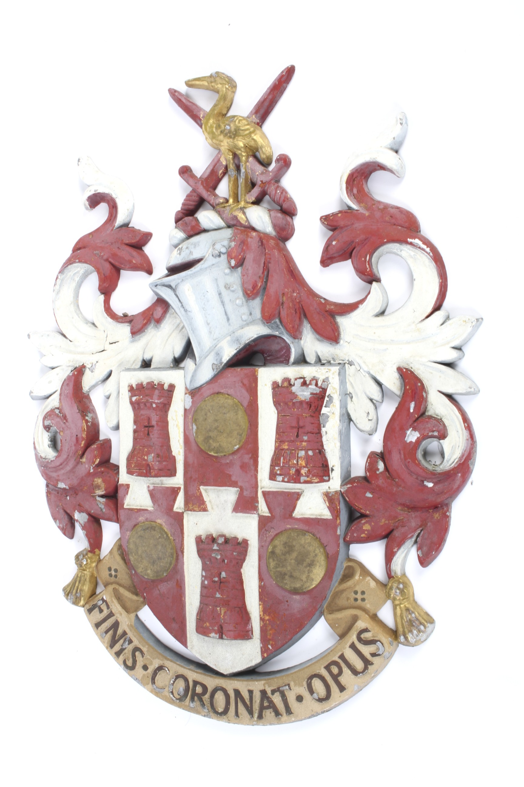 A painted, gilt and cast metal armorial plaque. Cast with a shield ...