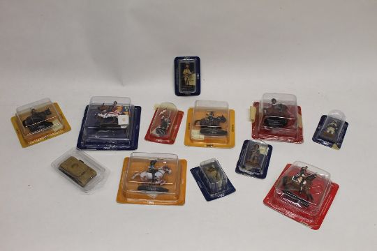 A group of +/- 15 Del Prado Collection models of figures & vehicles