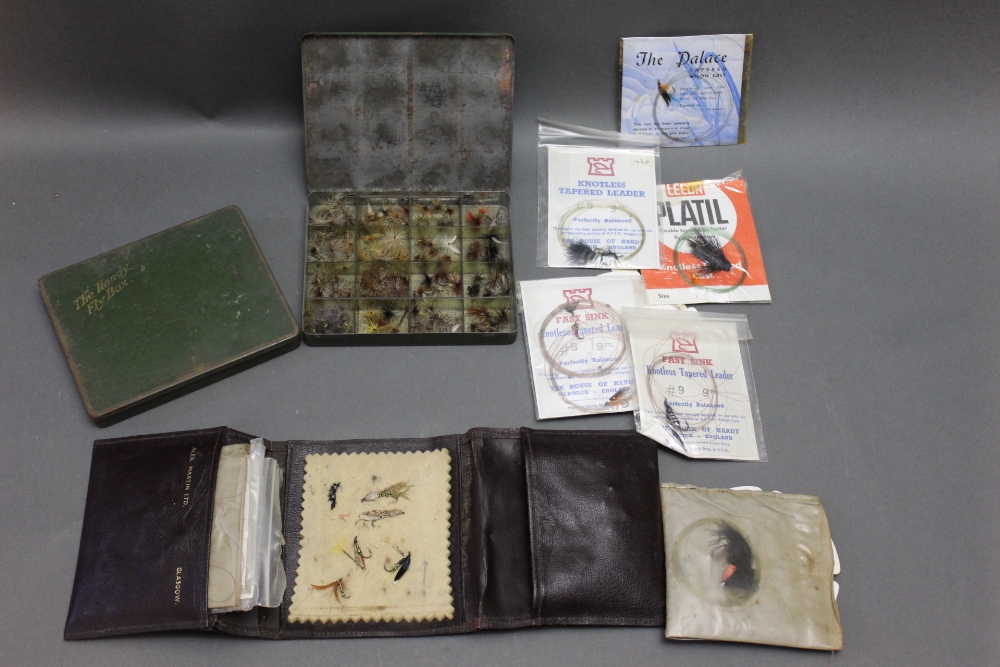 Alex Martin Ltd Glasgow, a leatherette cast wallet, containing Hardy ...
