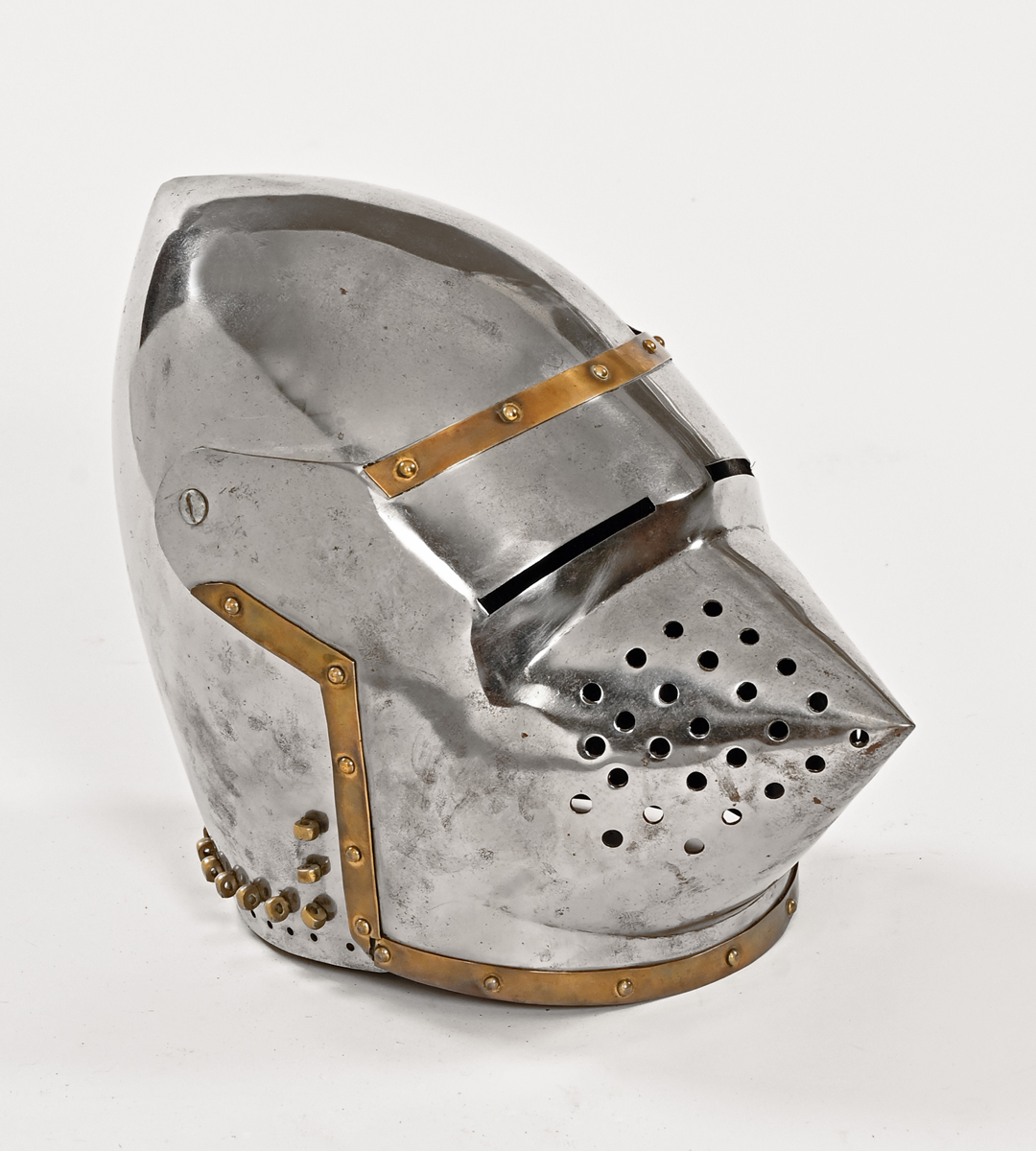 A 20th century replica medieval knights helmet, of pig snout design.