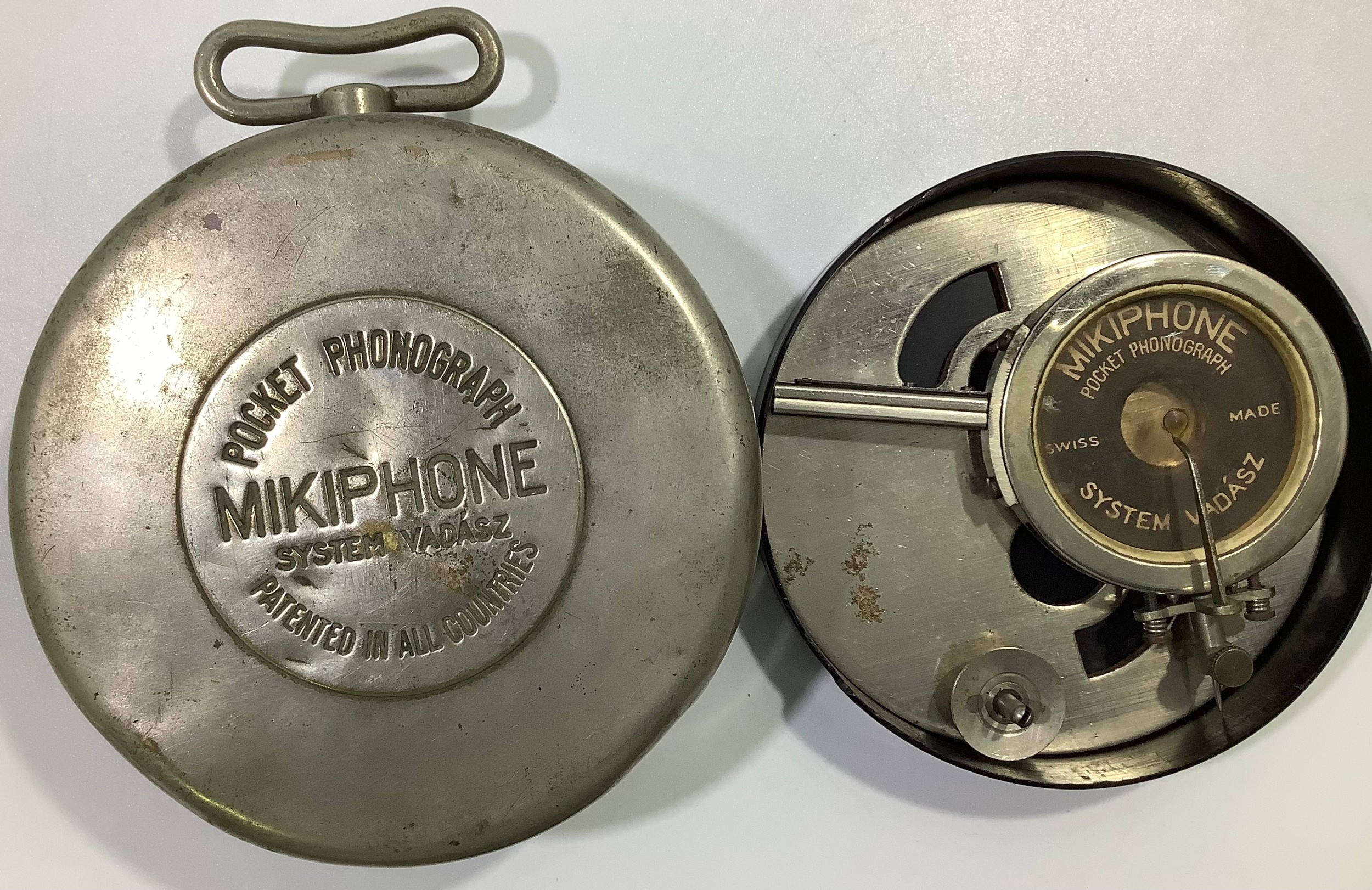 A 1920s System Vadász ‘Mikiphone’ pocket phonograph, housed in tin and ...
