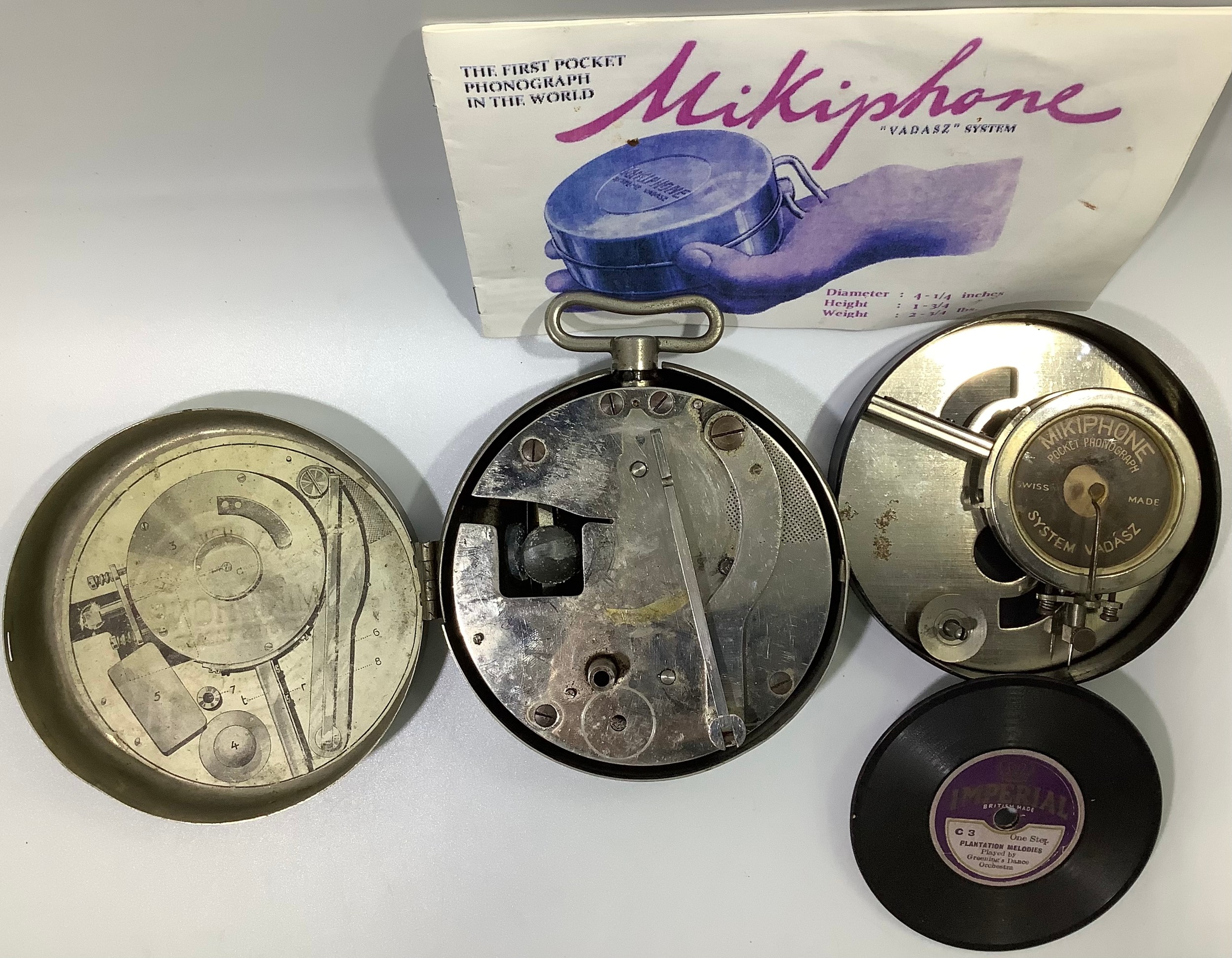 A 1920s System Vadász ‘Mikiphone’ pocket phonograph, housed in tin and ...