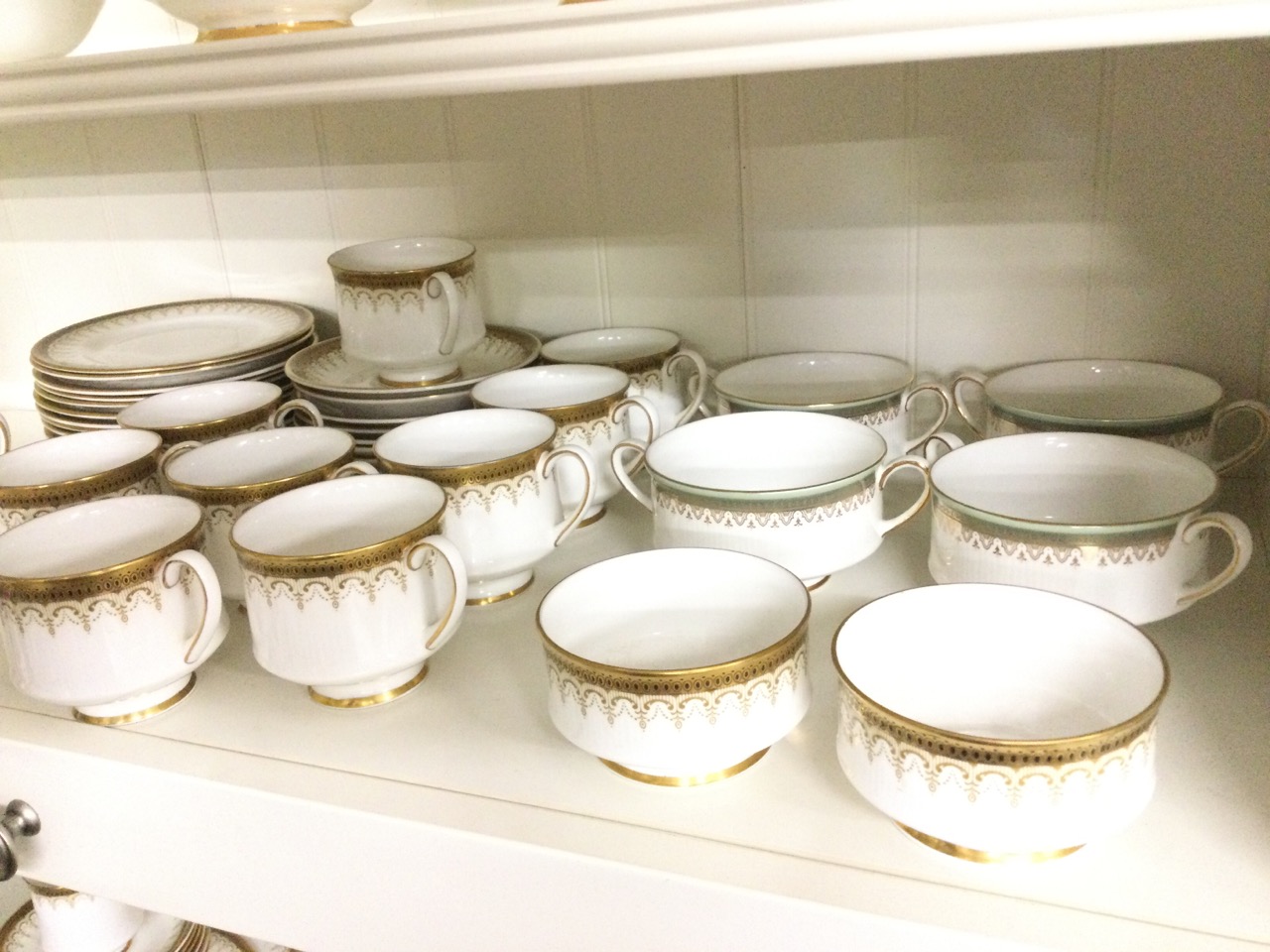 An extensive Paragon dinner/tea/coffee service decorated in the gilt ...