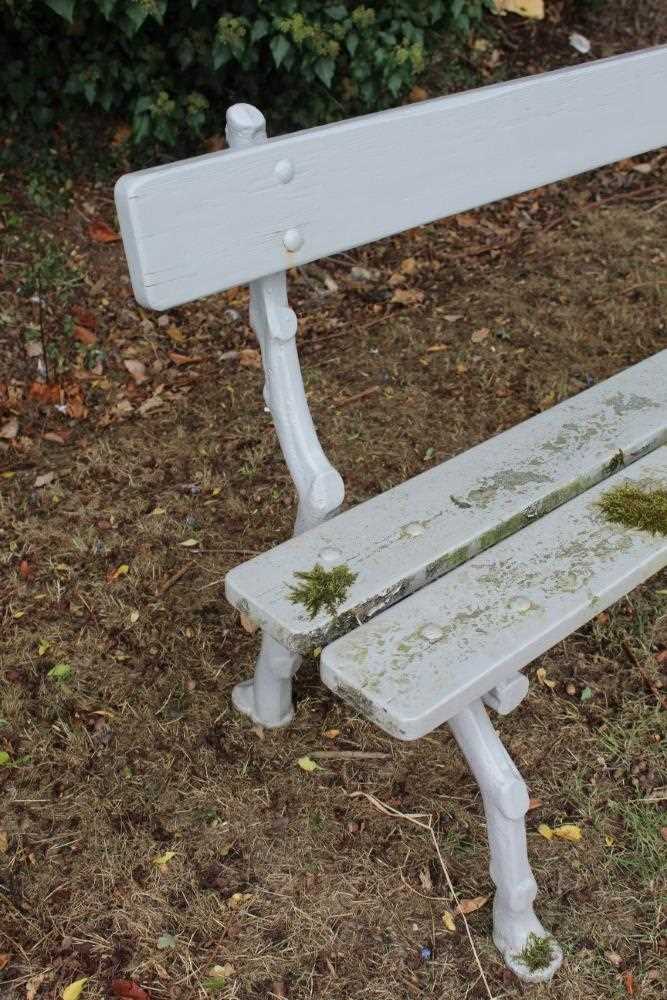 Victorian grey painted cast iron bench with naturalistic gnarled ...