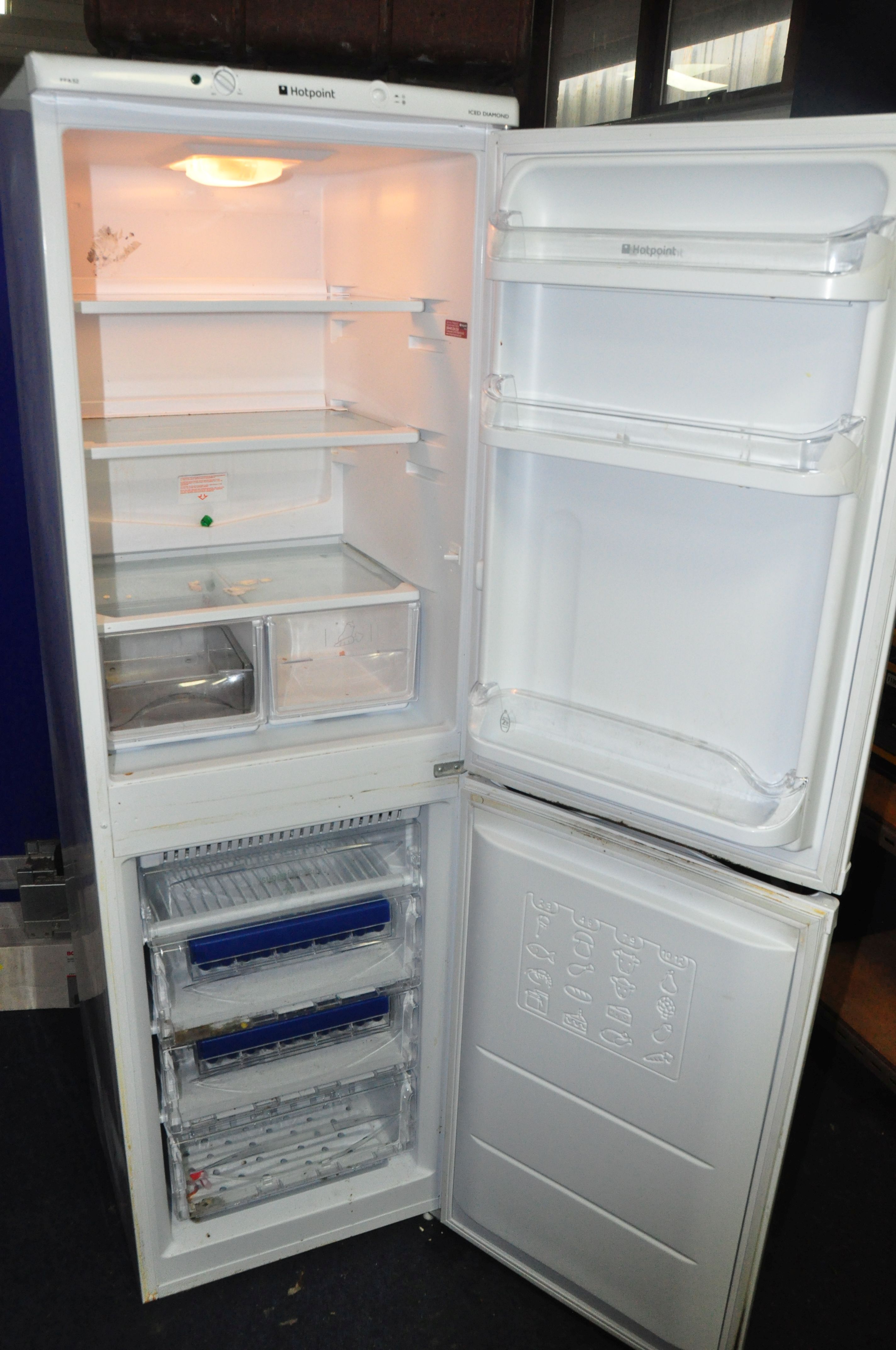 A HOTPOINT FFA52P TALL FRIDGE FREEZER measuring width 54cm x depth 56cm ...