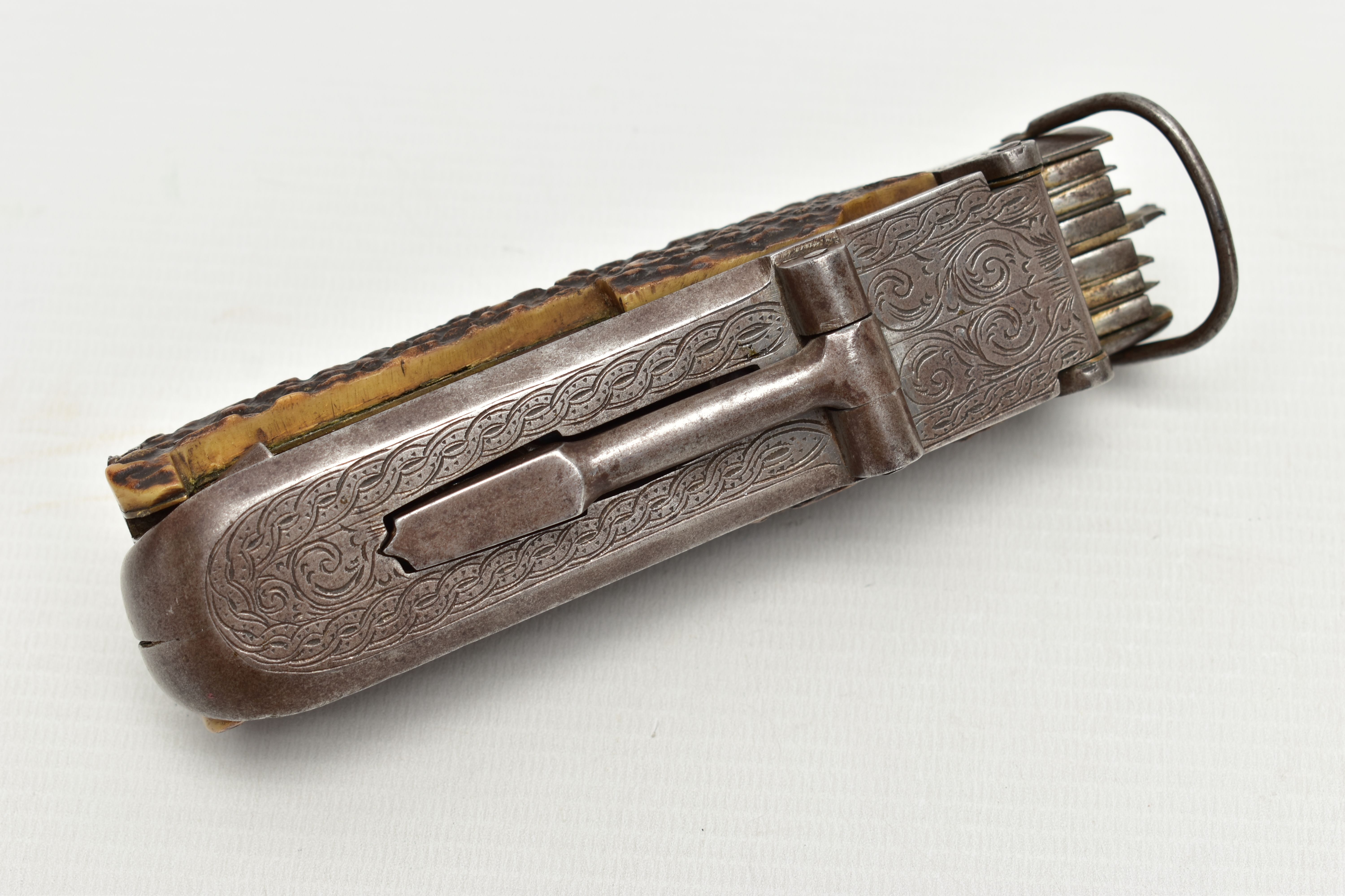 A VICTORIAN HORN AND STEEL MULTI-BLADED COACHMAN'S KNIFE, the folding ...