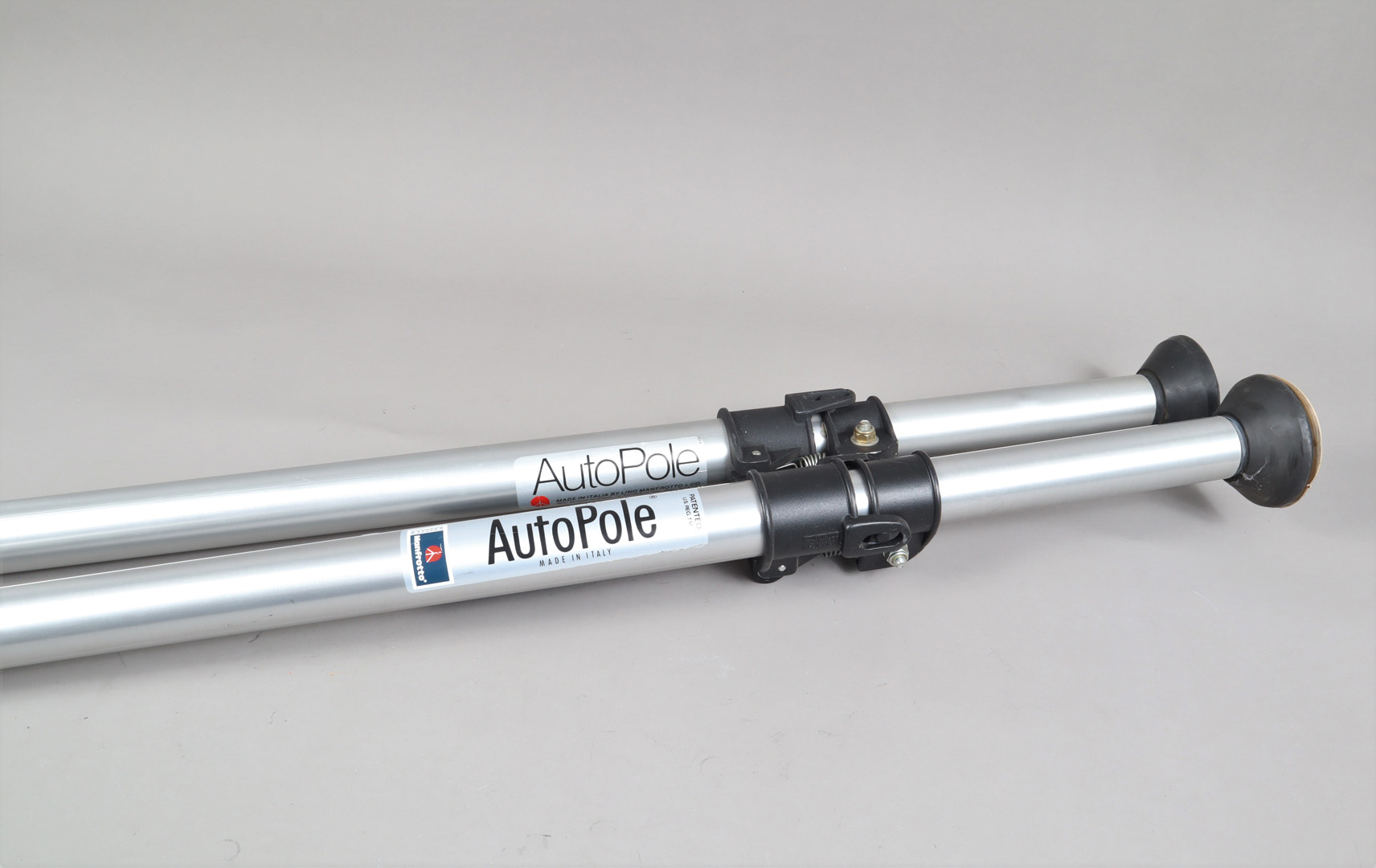 Two Manfrotto Autopoles, extend from 210cm to 376cm, both move freely ...
