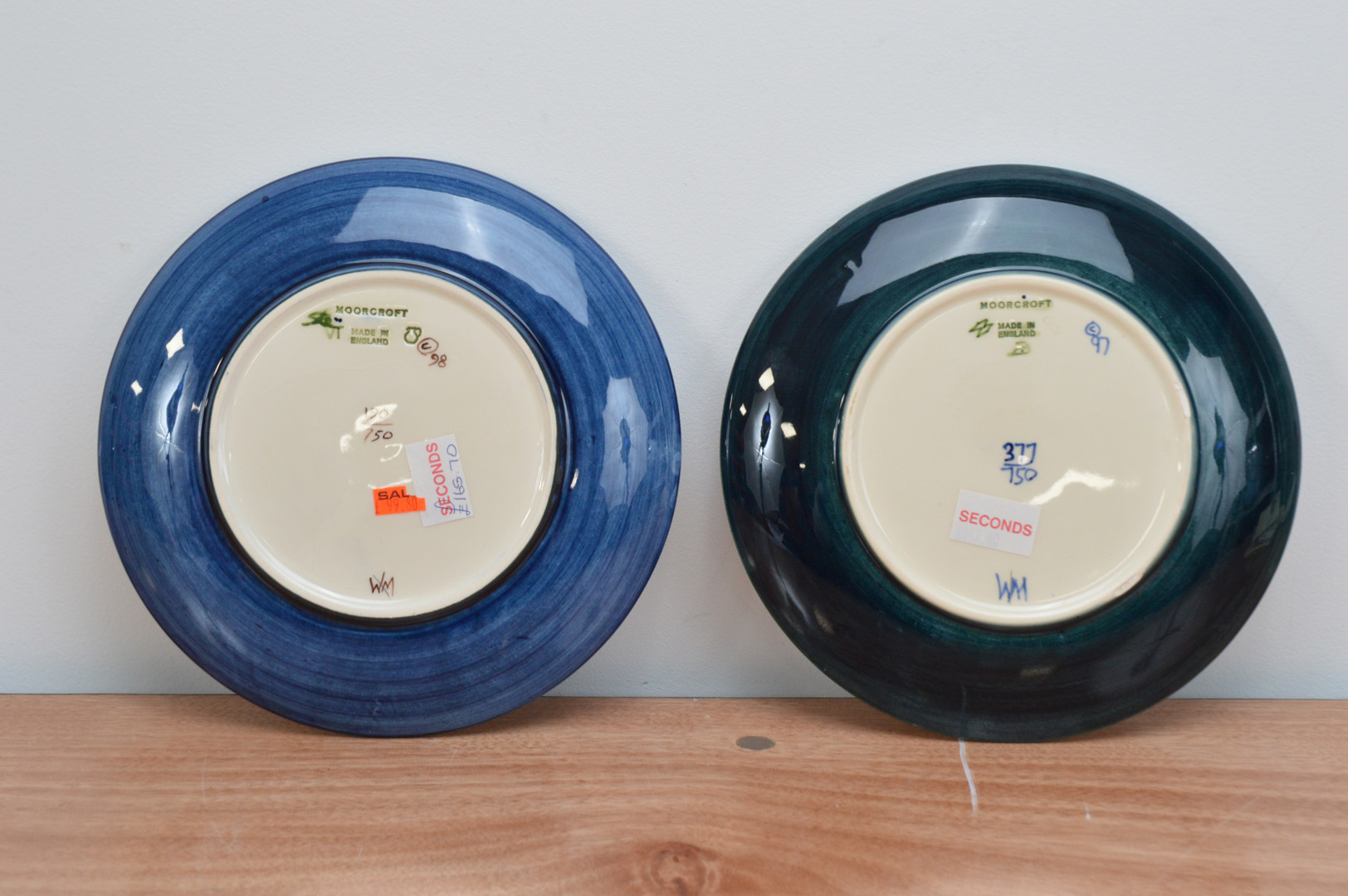 Two dated seconds Moorcroft pottery plates, 1998 and 1999, both 22cm in ...