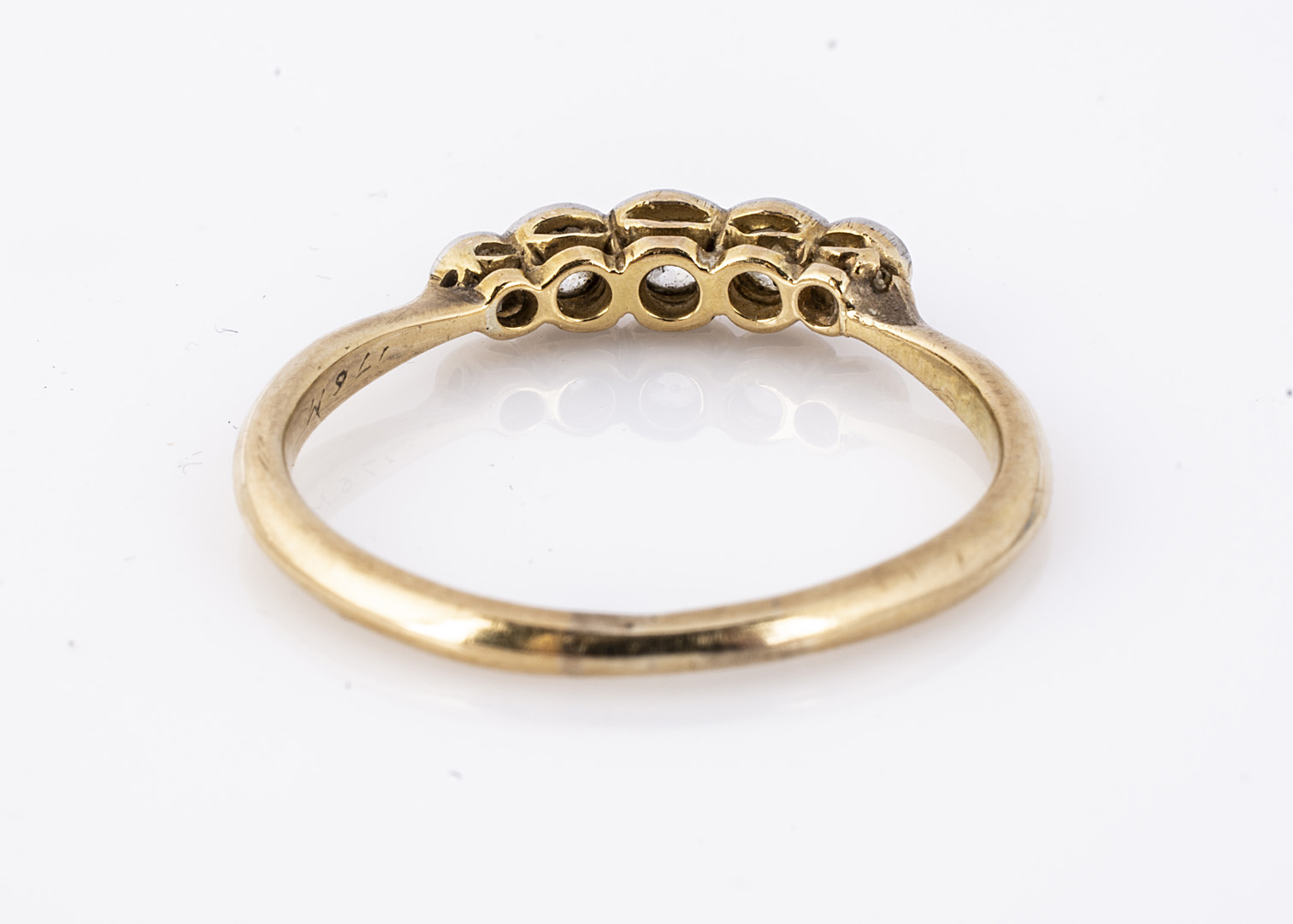 An 18ct and platinum five stone old cut diamond ring, millegrain ...