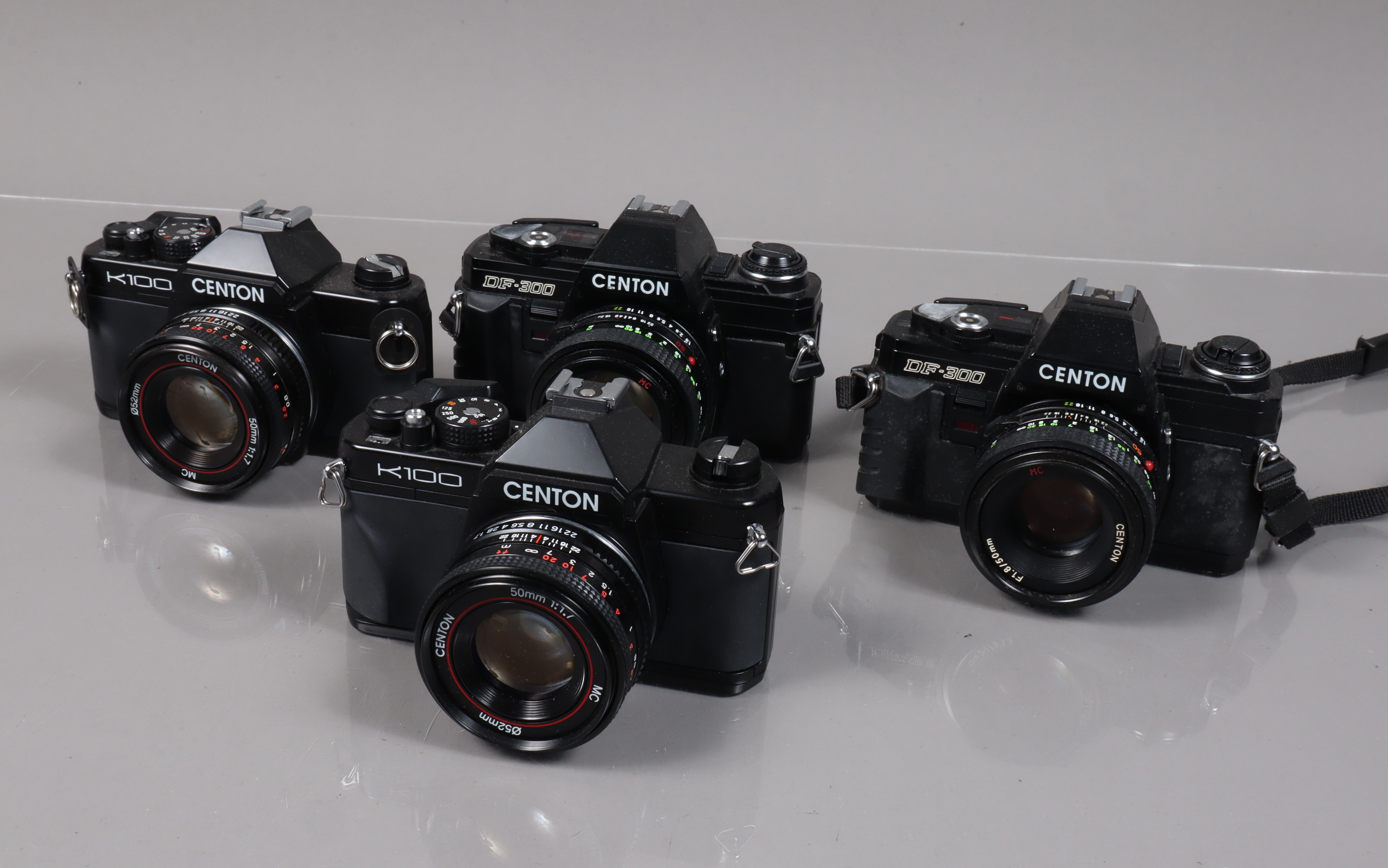 Four Centon SLR Cameras, two Centon K100, shutters working, meters ...