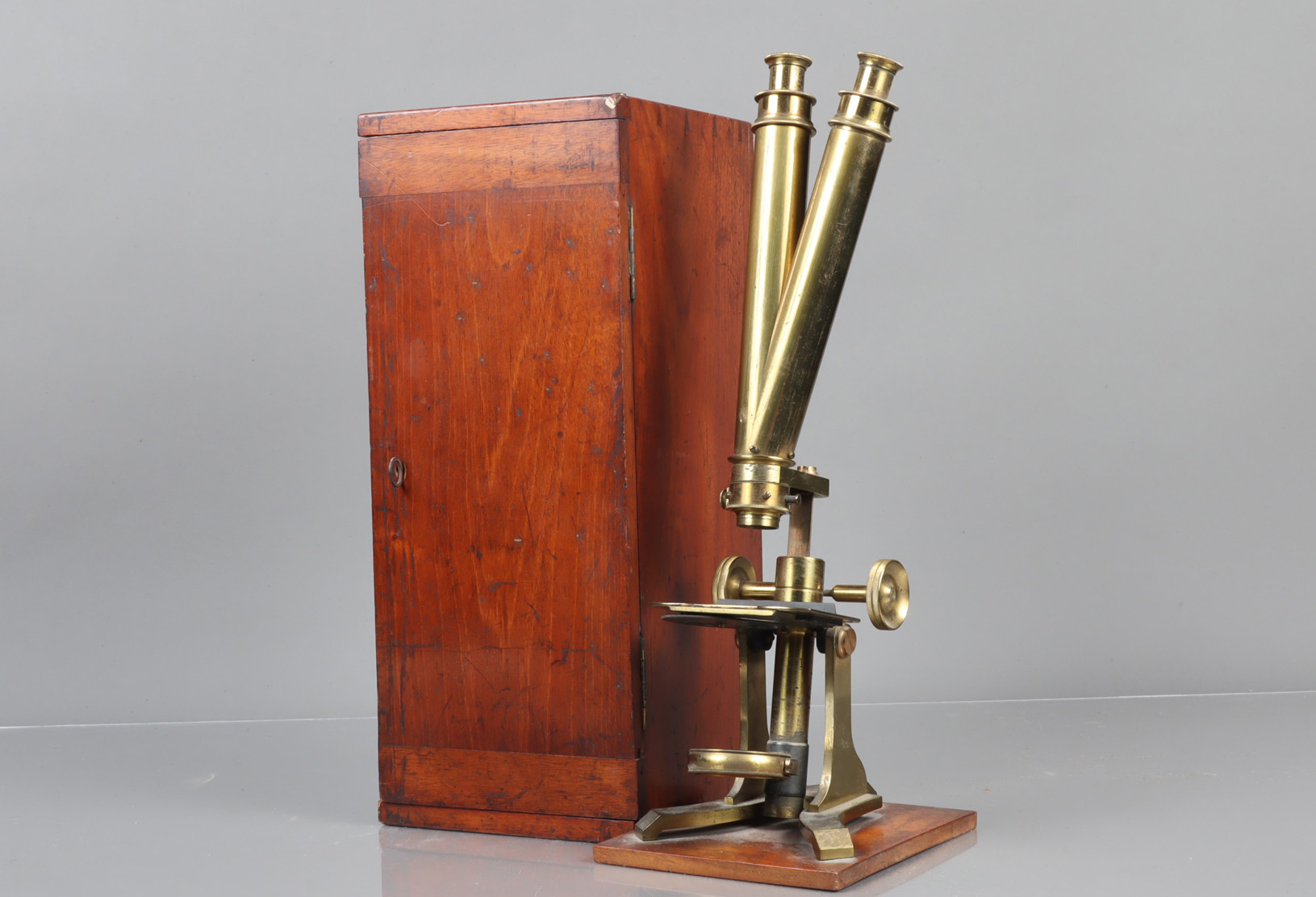 A late 19th Century unnamed lacquered brass Wenham Binocular Microscope ...