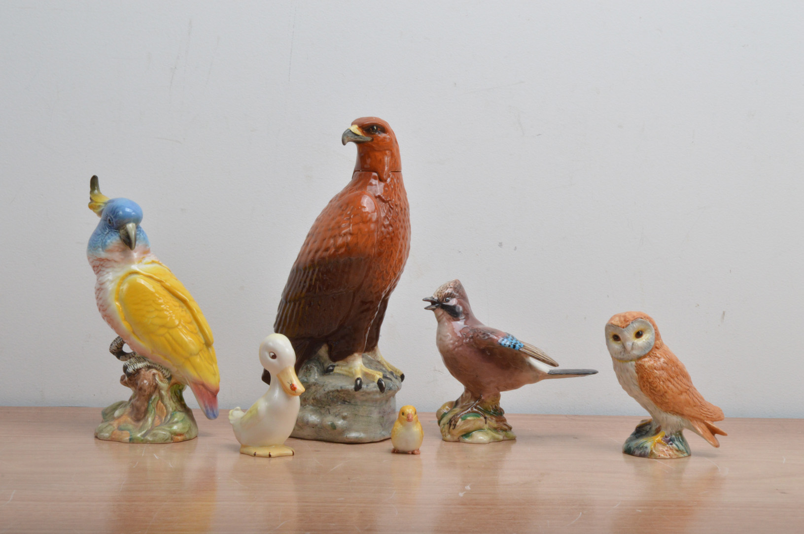 A collection of Beswick ceramic birds, including the Golden Eagle ...