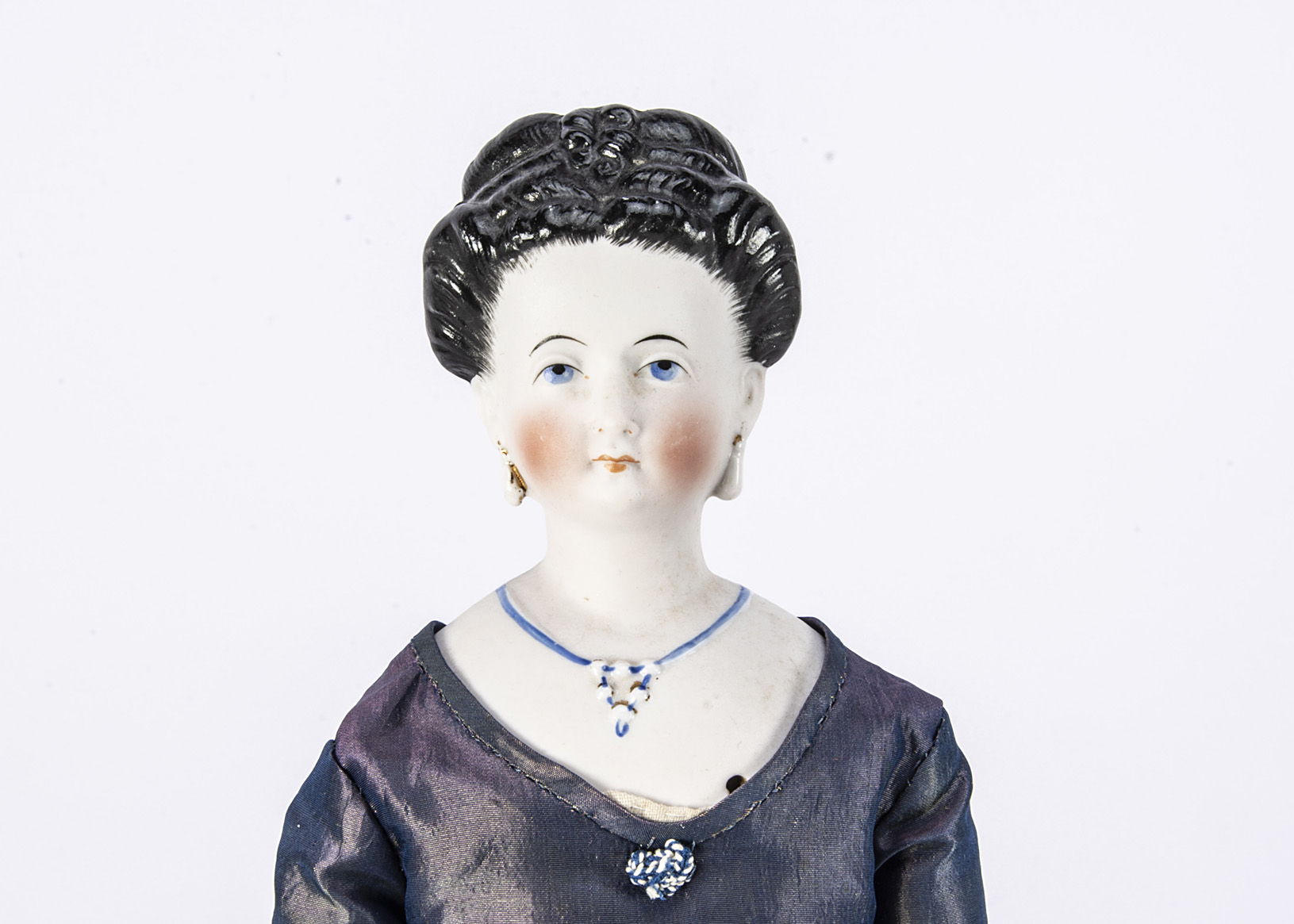 A rare German mid 19th century bisque shoulder head doll with moulded ...