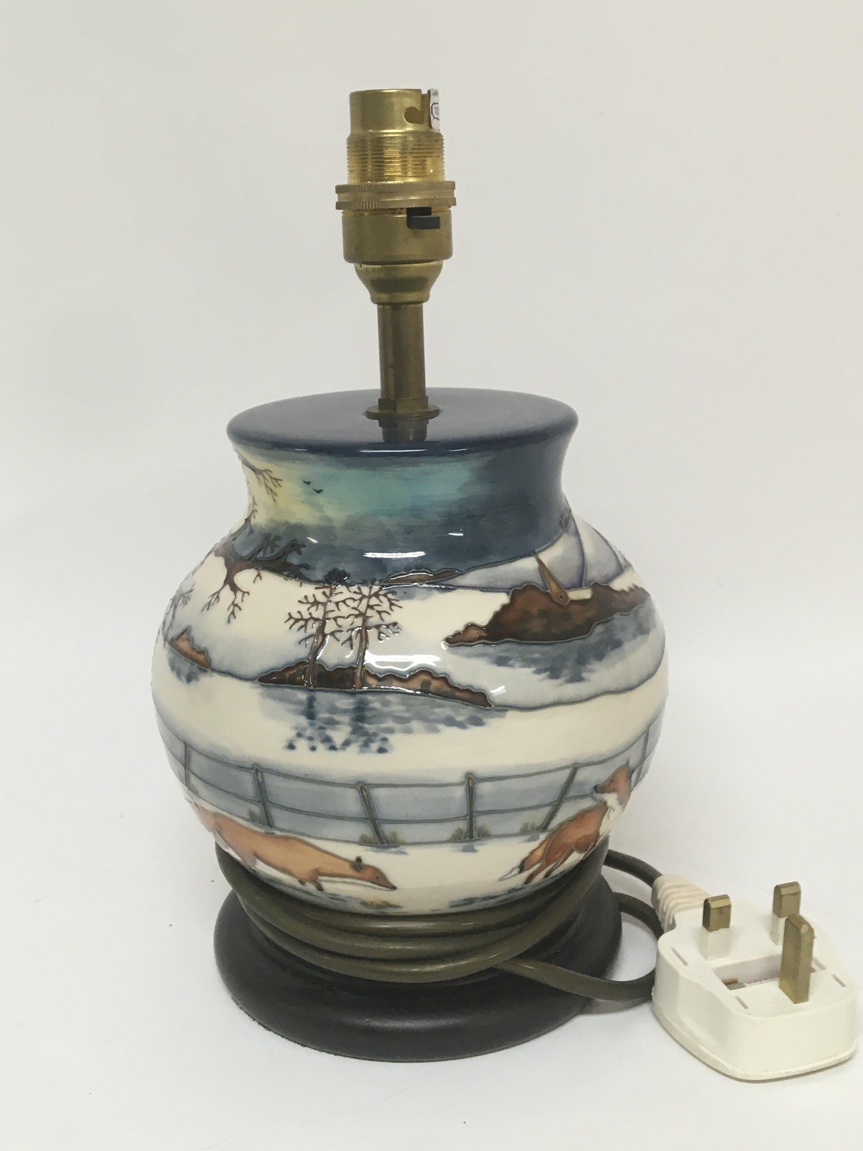 A Moorcroft lamp Fox in the snow pattern lamp fitted for electric 26cm ...