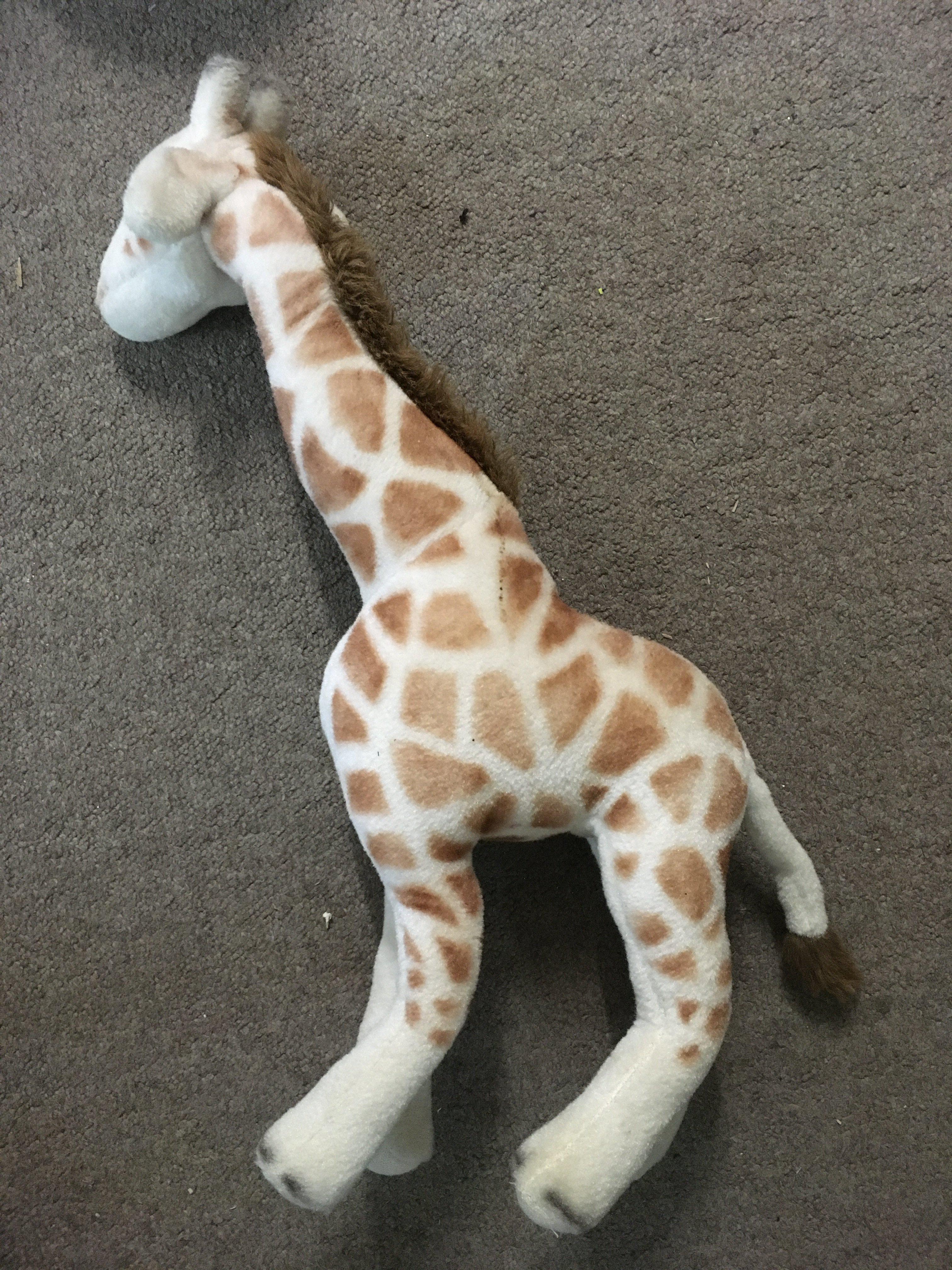 A Merrythought soft toy giraffe