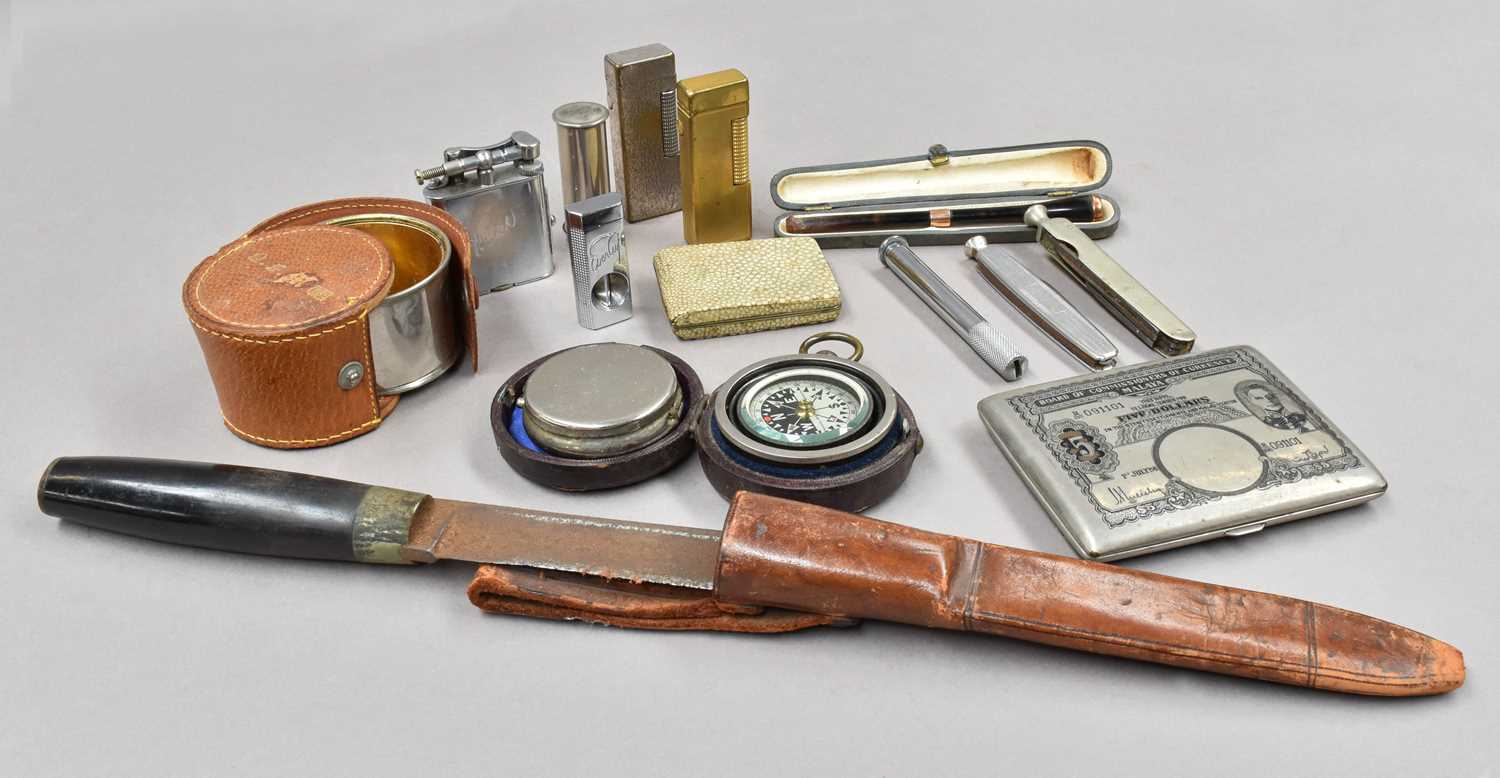 Two Dunhill Rollagas lighters, a 9ct gold tortoiseshell mounted cheroot ...