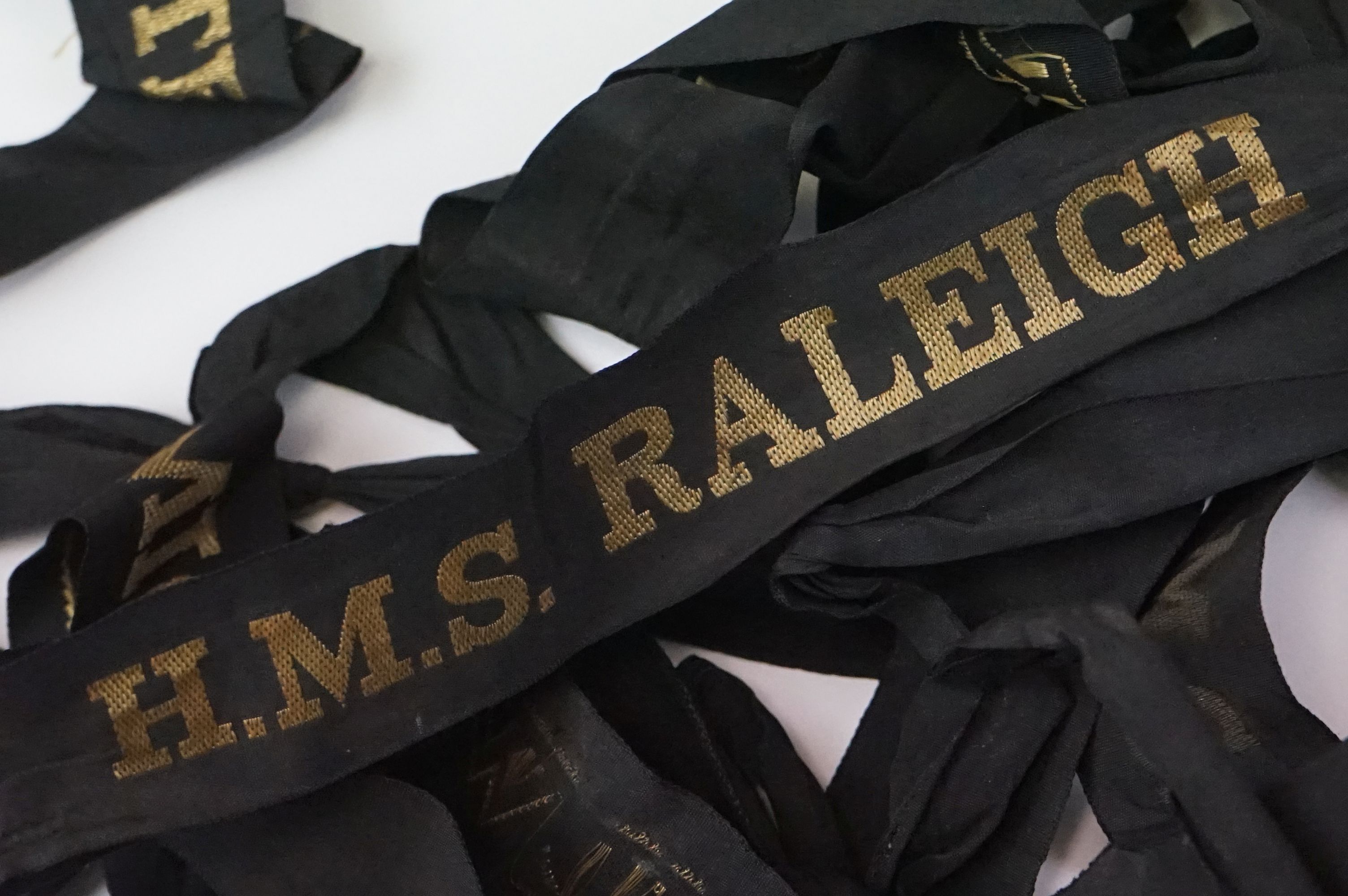 A Collection Of Approx Twelve British Royal Navy Cap / Hat Tallies To ...