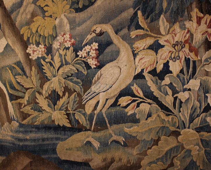 An Early 18th Century Verdure Tapestry Fragment depicting woodland with ...