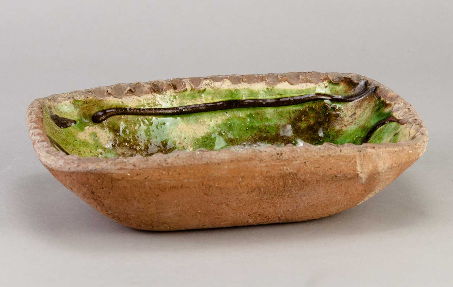 Attributed to RAY FINCH (1914-2012) for Winchcombe Pottery; a press ...