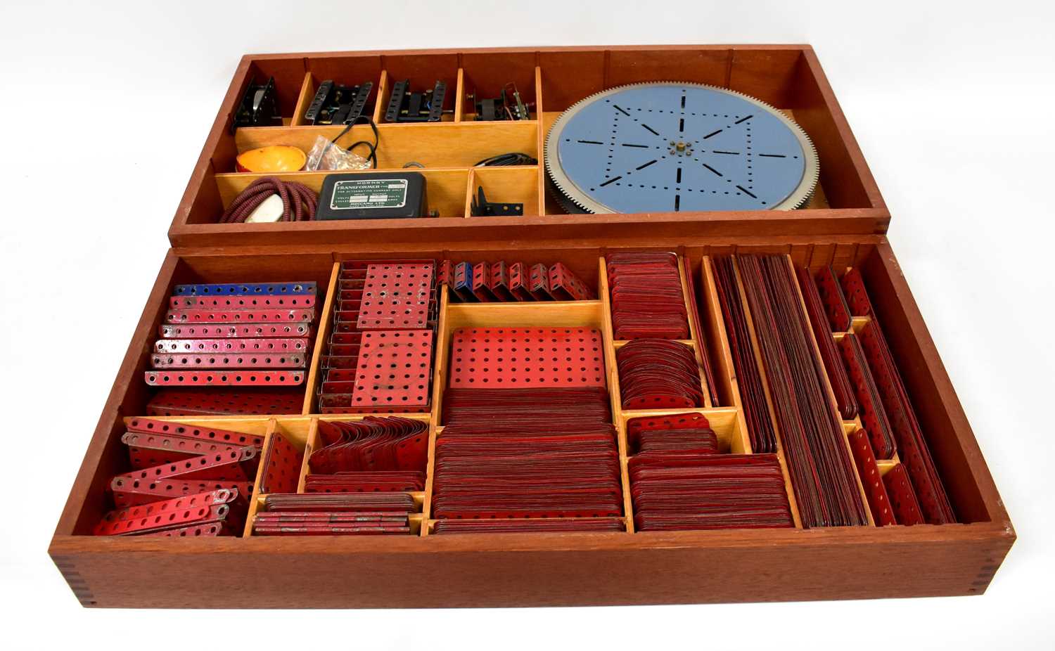 MECCANO; a large quantity of loose pieces, organised into six ...