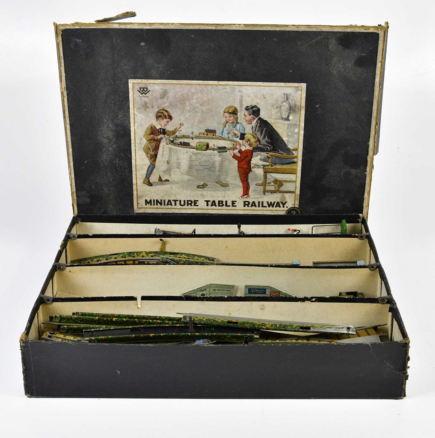 BING; a boxed miniature tin plate table railway with clockwork locomotive.
