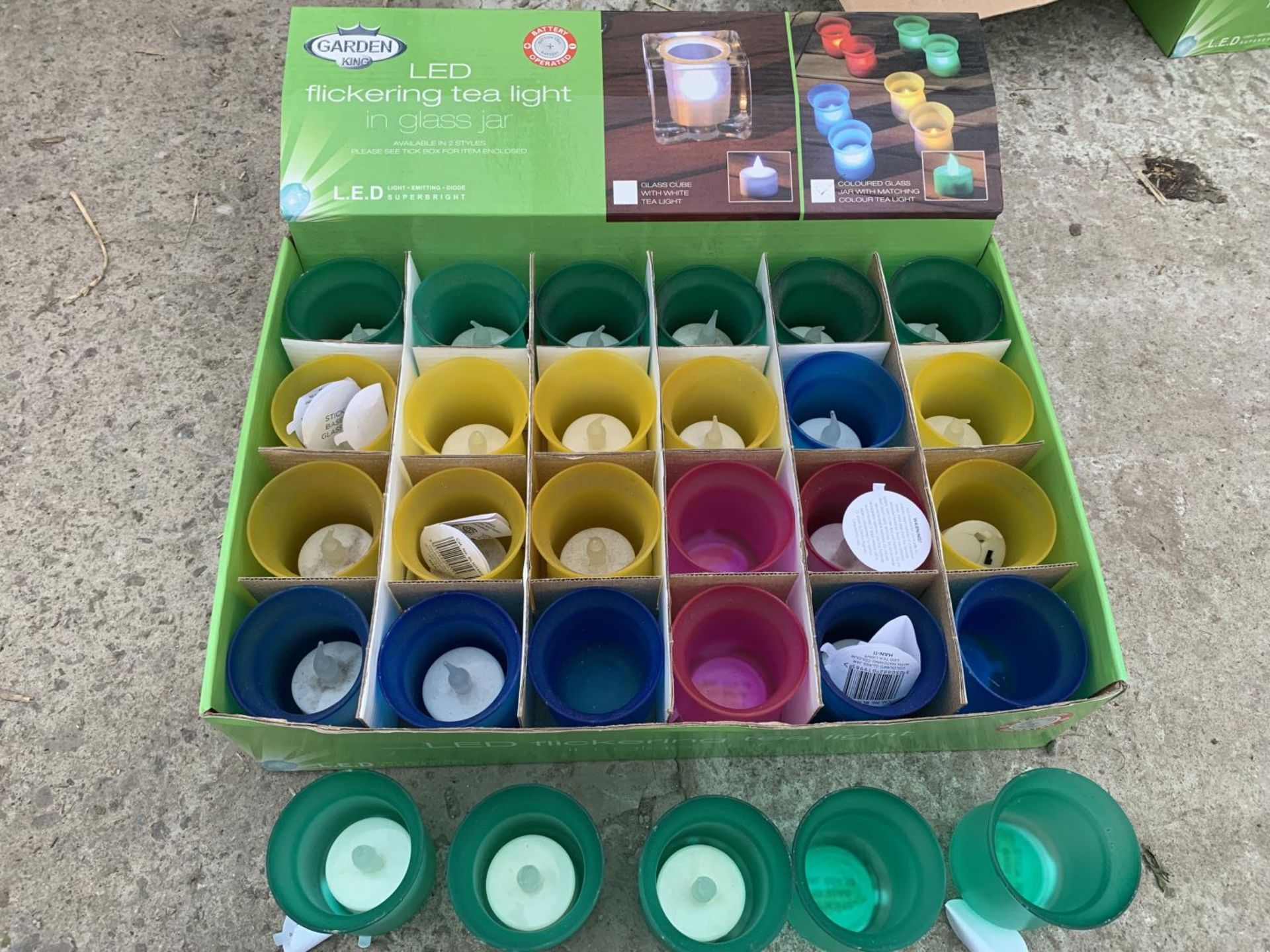 TWENTY NINE COLOURED GLASS TEA LIGHT HOLDERS SOME WITH FLICKERING TEA ...