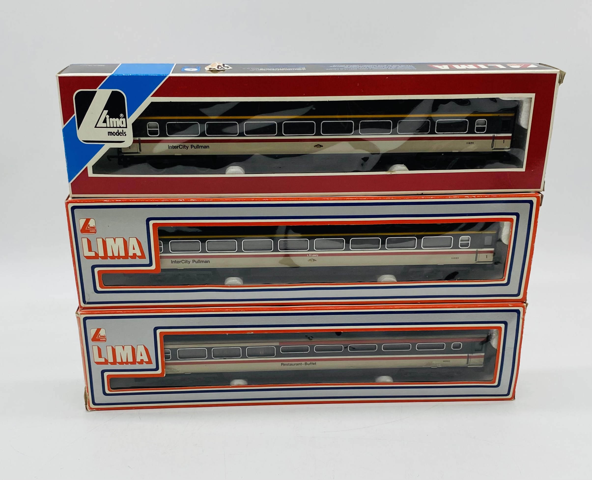 A collection of seven boxed Lima OO gauge carriages including Intercity ...