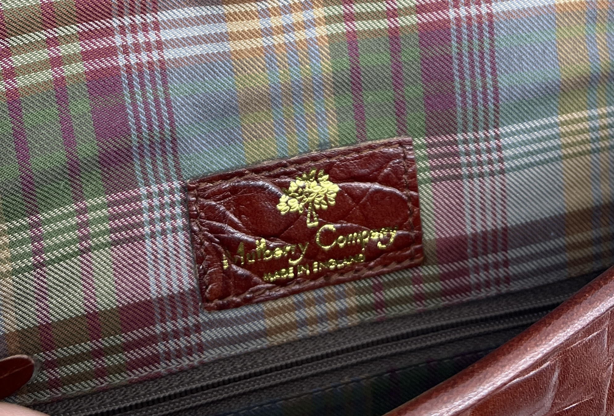 A Mulberry cross body leather "Saddle" bag with tartan interior and ...