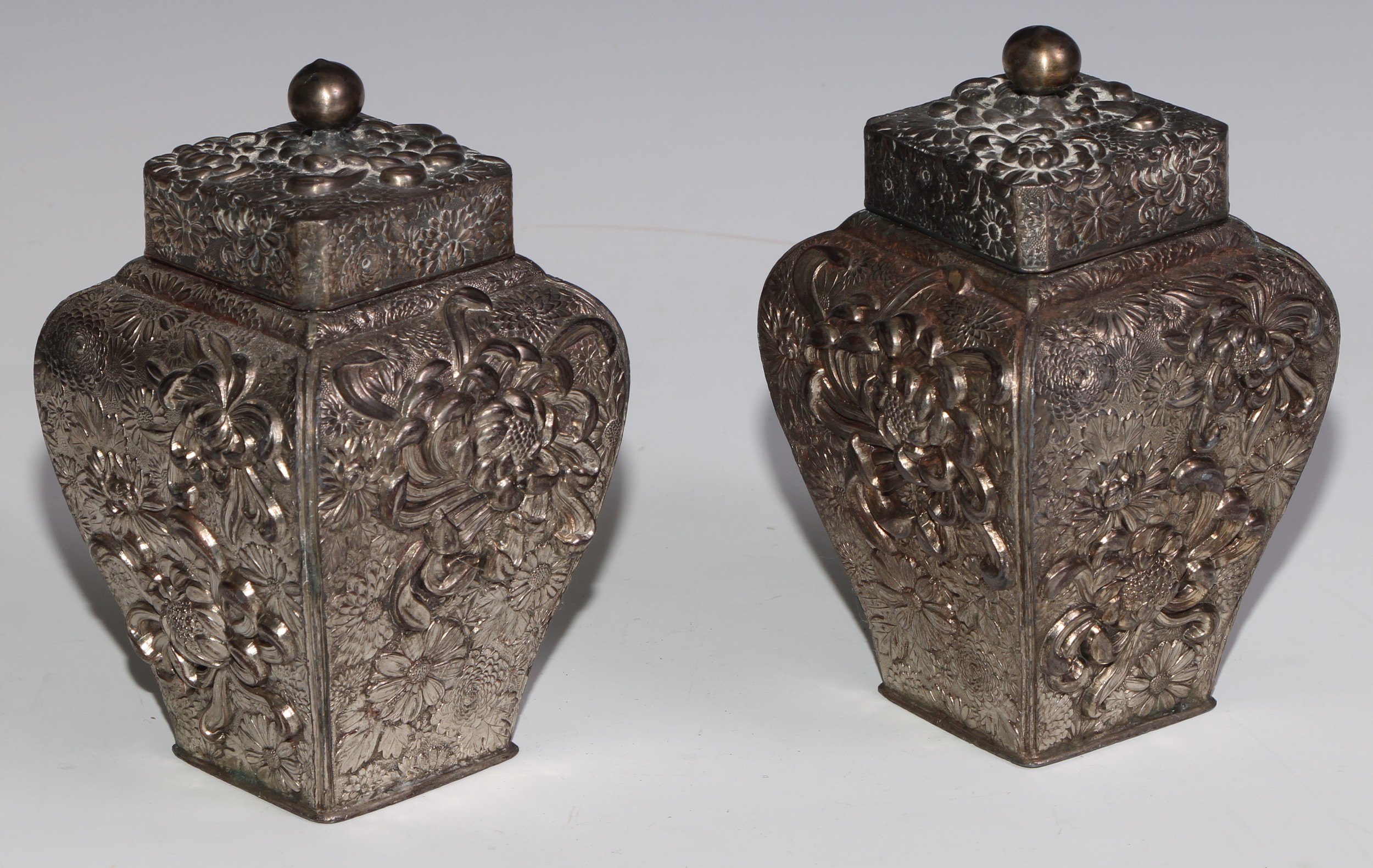 A pair of Japanese antimony square bombe shaped tea caddies, each with ...