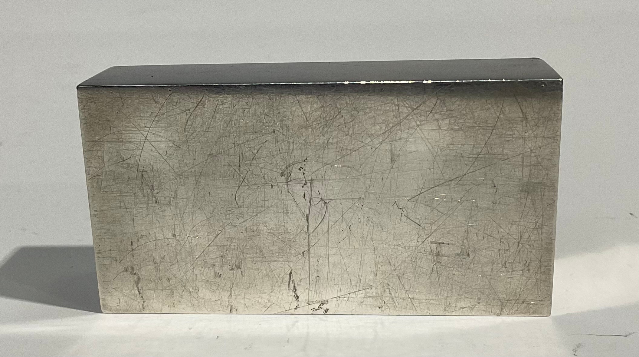 A late 19th century American silver ingot or desk weight, "From ...