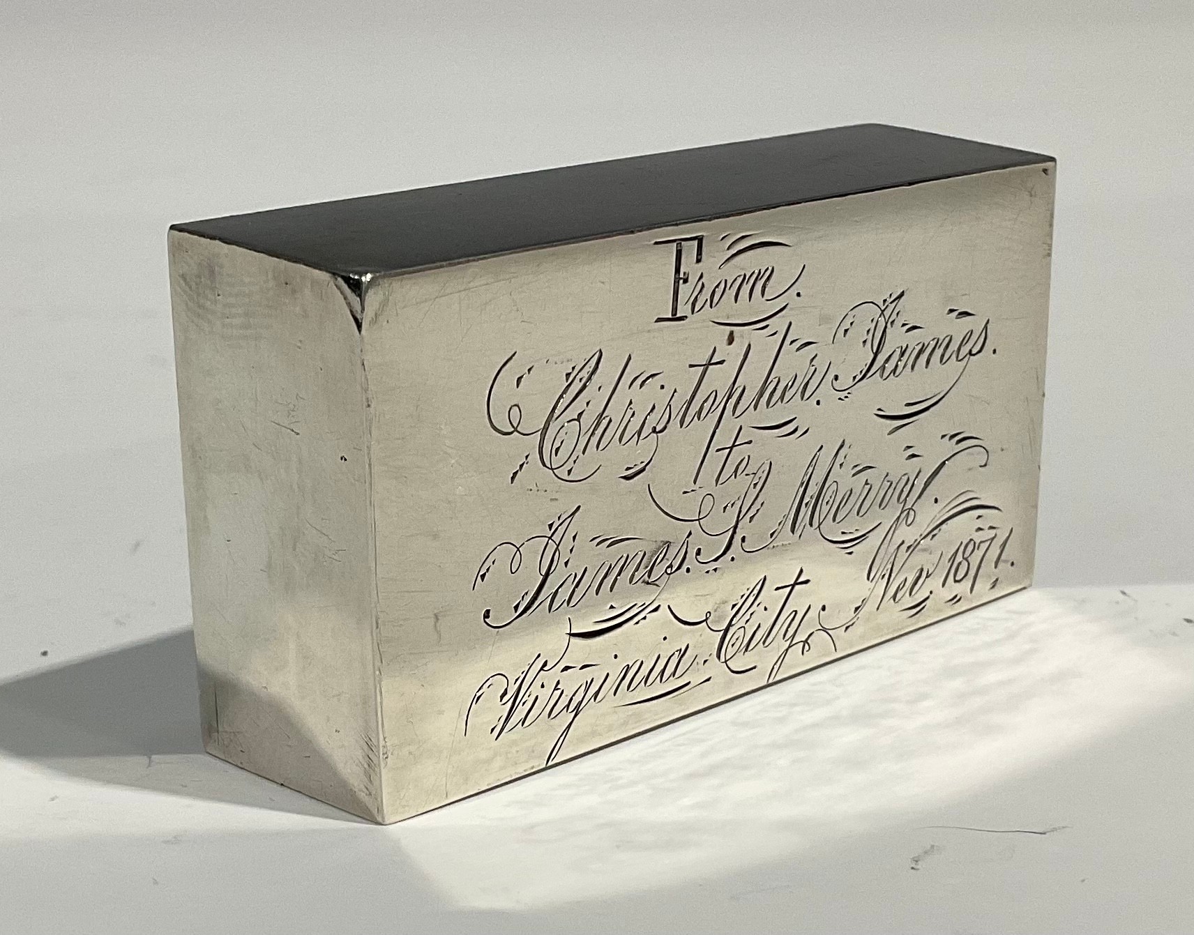 A late 19th century American silver ingot or desk weight, "From ...