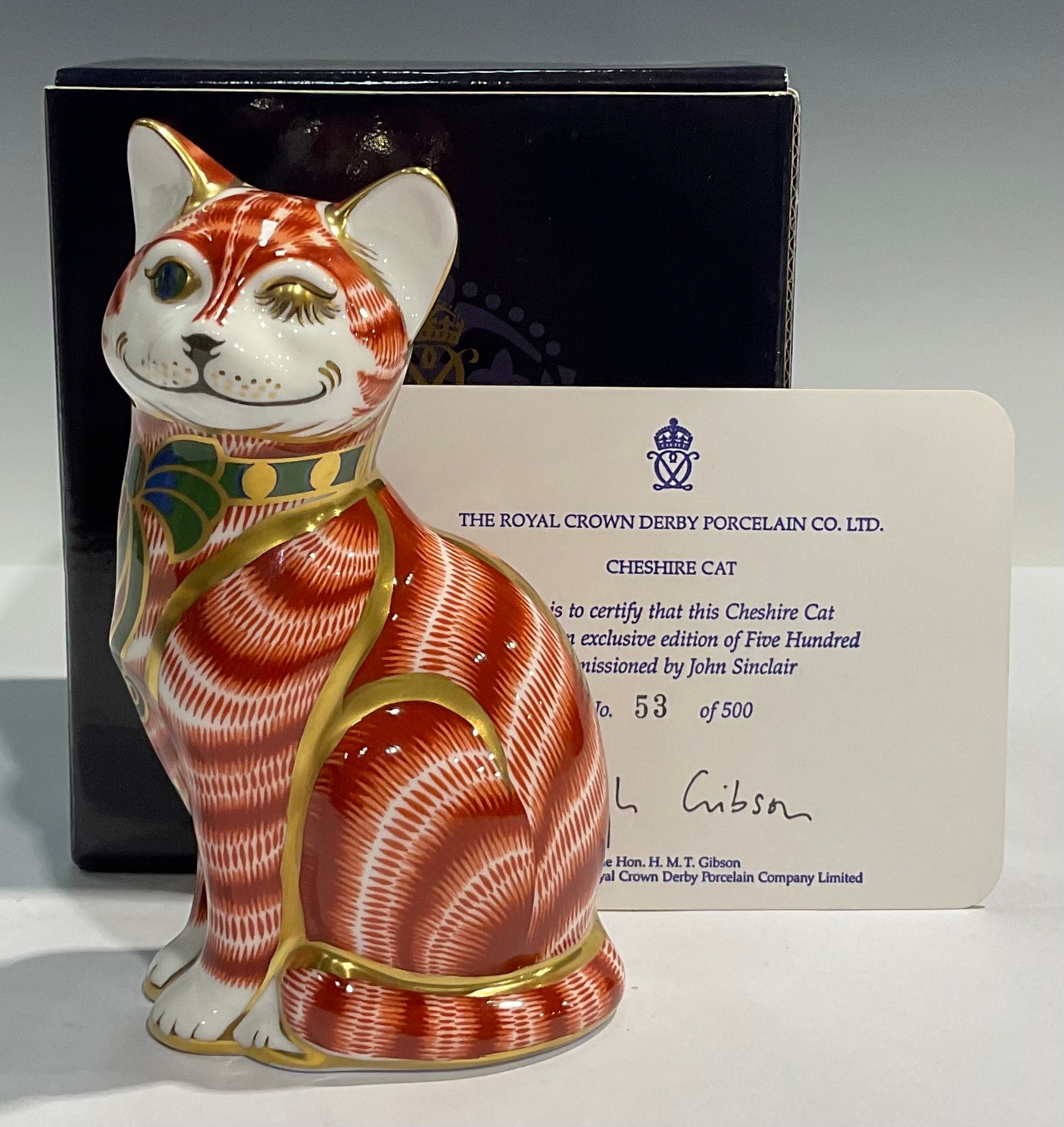 A Royal Crown Derby paperweight, Cheshire Cat, John Sinclair exclusive ...