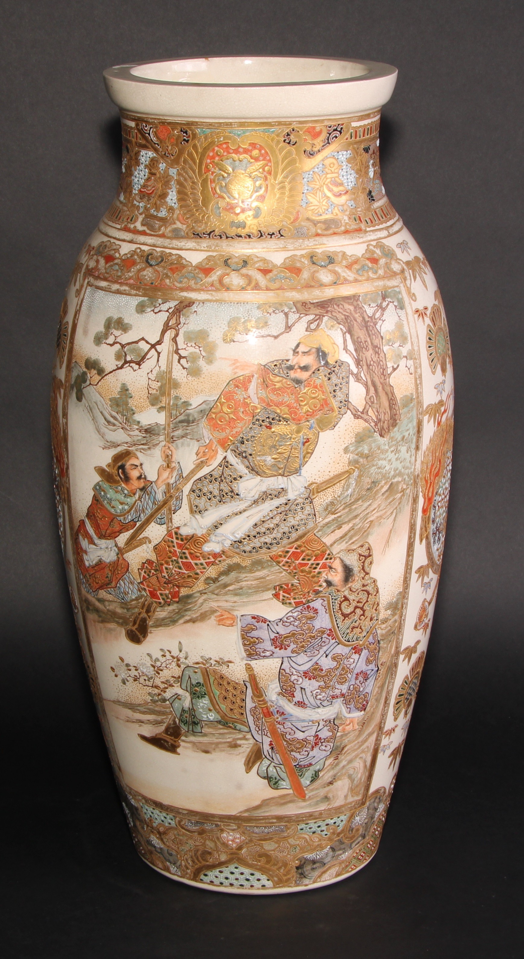 A Japanese Satsuma ovoid vase, painted in the typical palette with ...