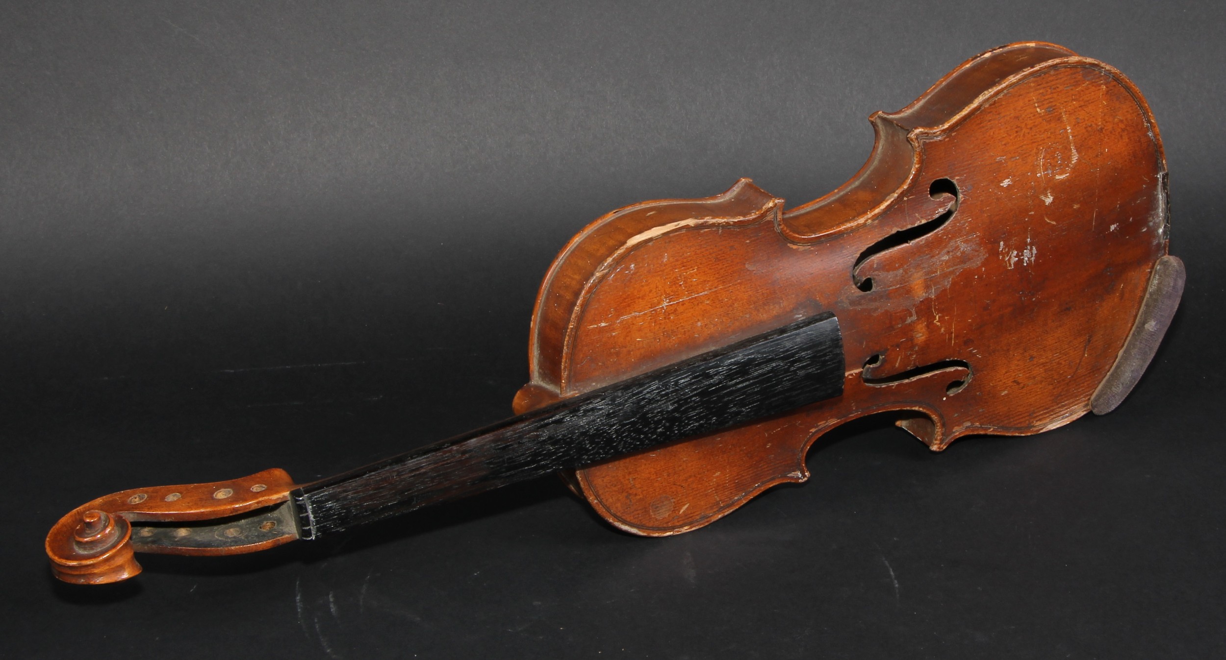 A violin, the two-piece back 33.5cm long excluding button, Stradivarius ...