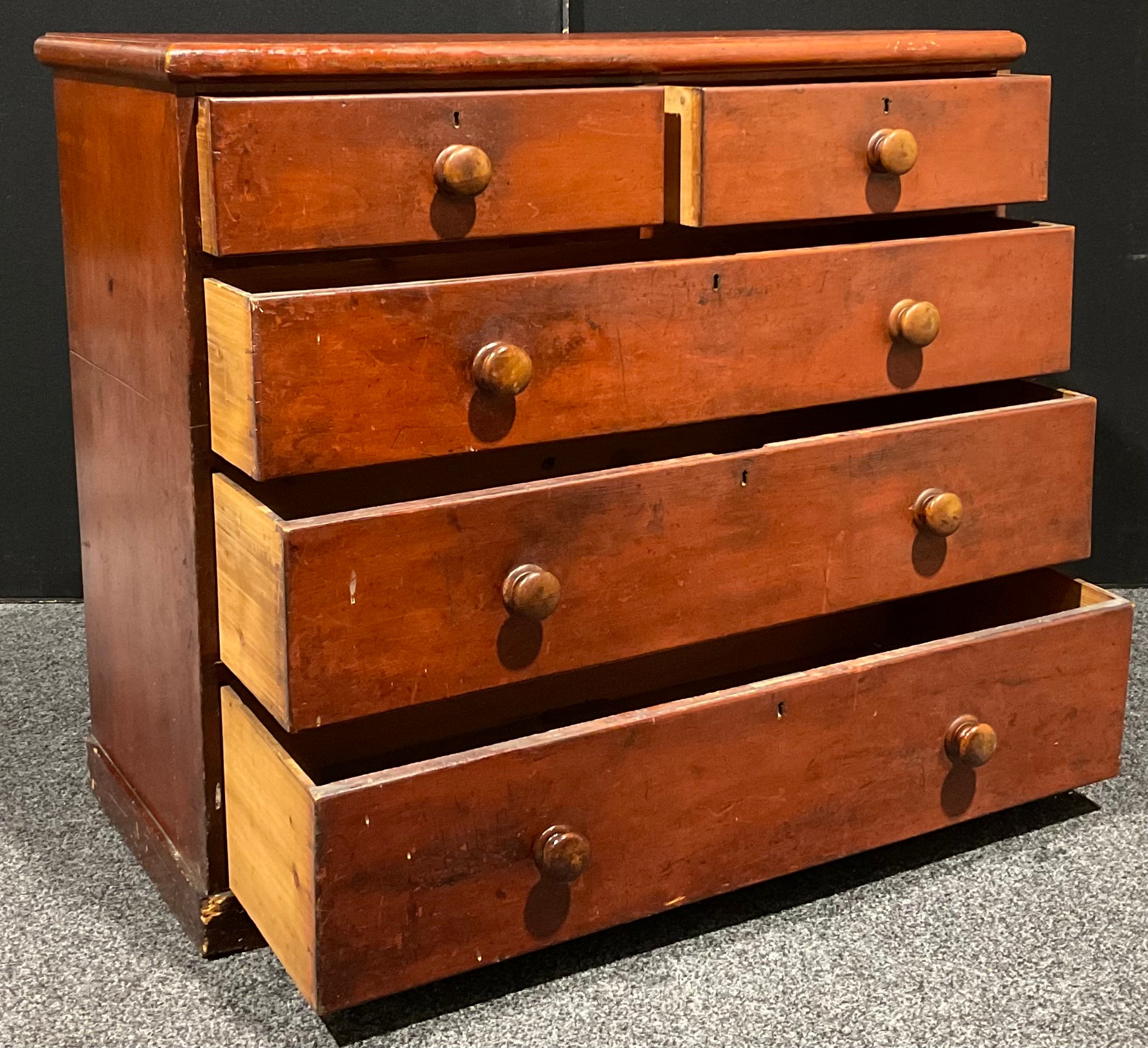 A Victorian pine chest, or two short and three long graduated drawers ...