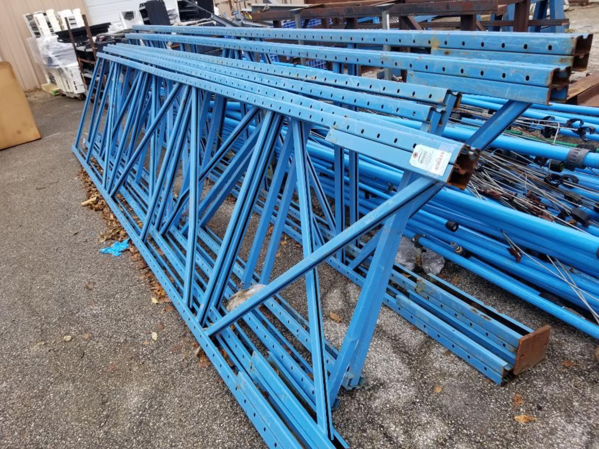 Qty 6 - Pallet racking uprights. 197in in tall by 44in deep. Slot style.
