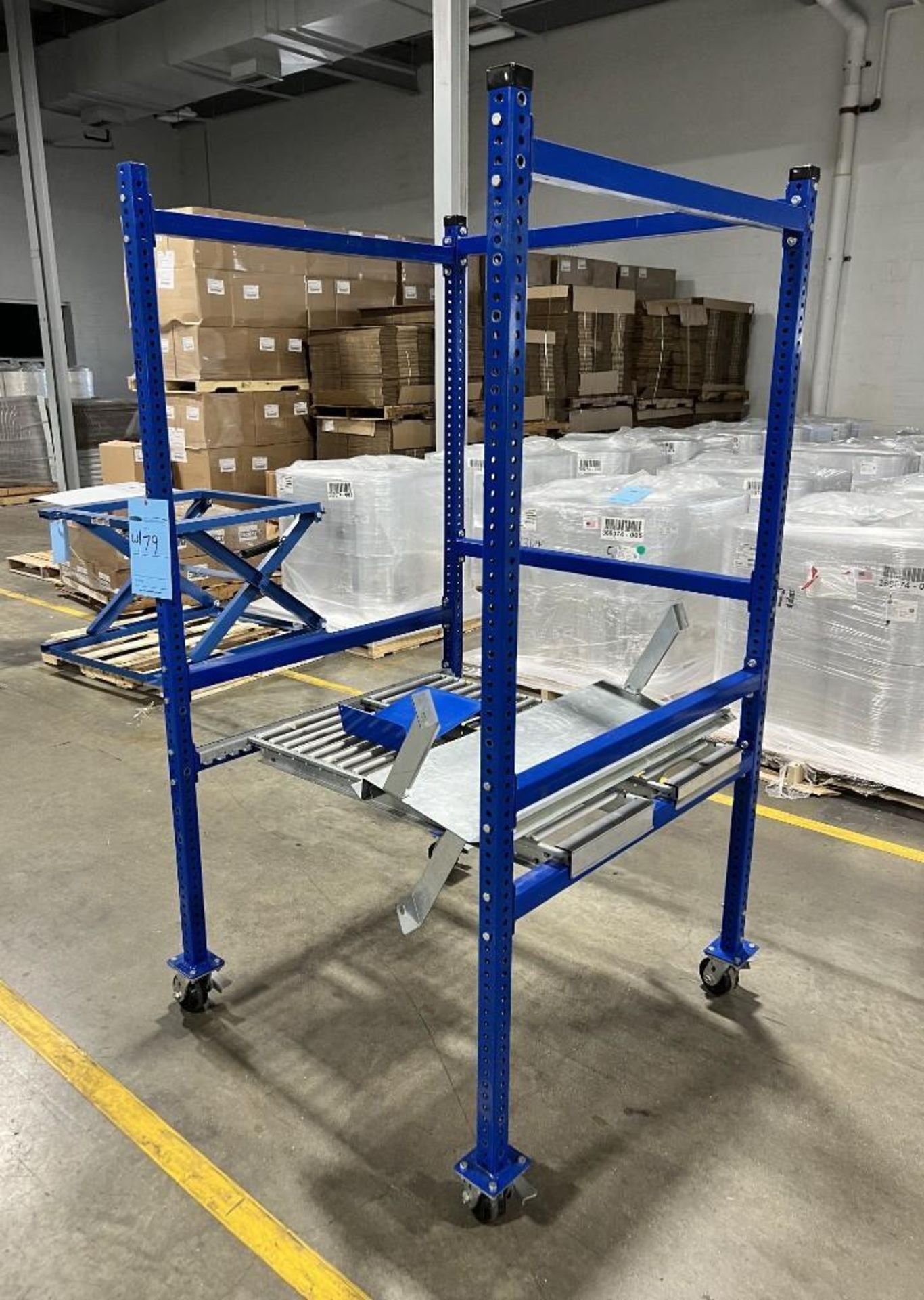 Lot Consisting Of: (3) Portable parts racks, (1) portable coat rack.