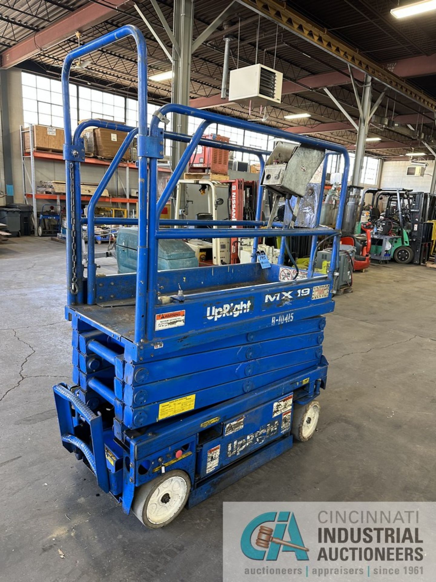 UPRIGHT MODEL MX19 ELECTRIC SCISSOR LIFT; S/N 10415, BUILT IN CHARGER ...