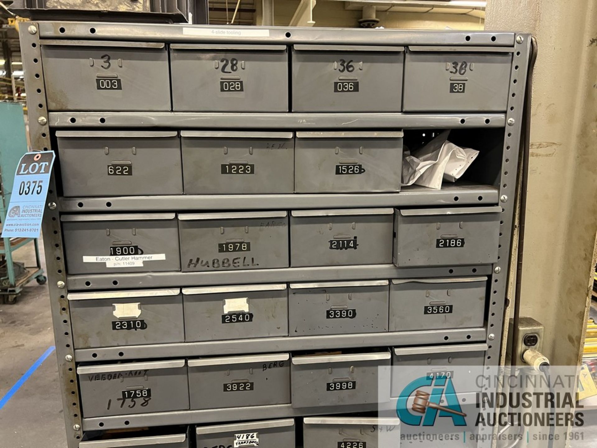 (LOT) MISCELLANEOUS FOUR-SLIDE TOOLING WITH CABINET