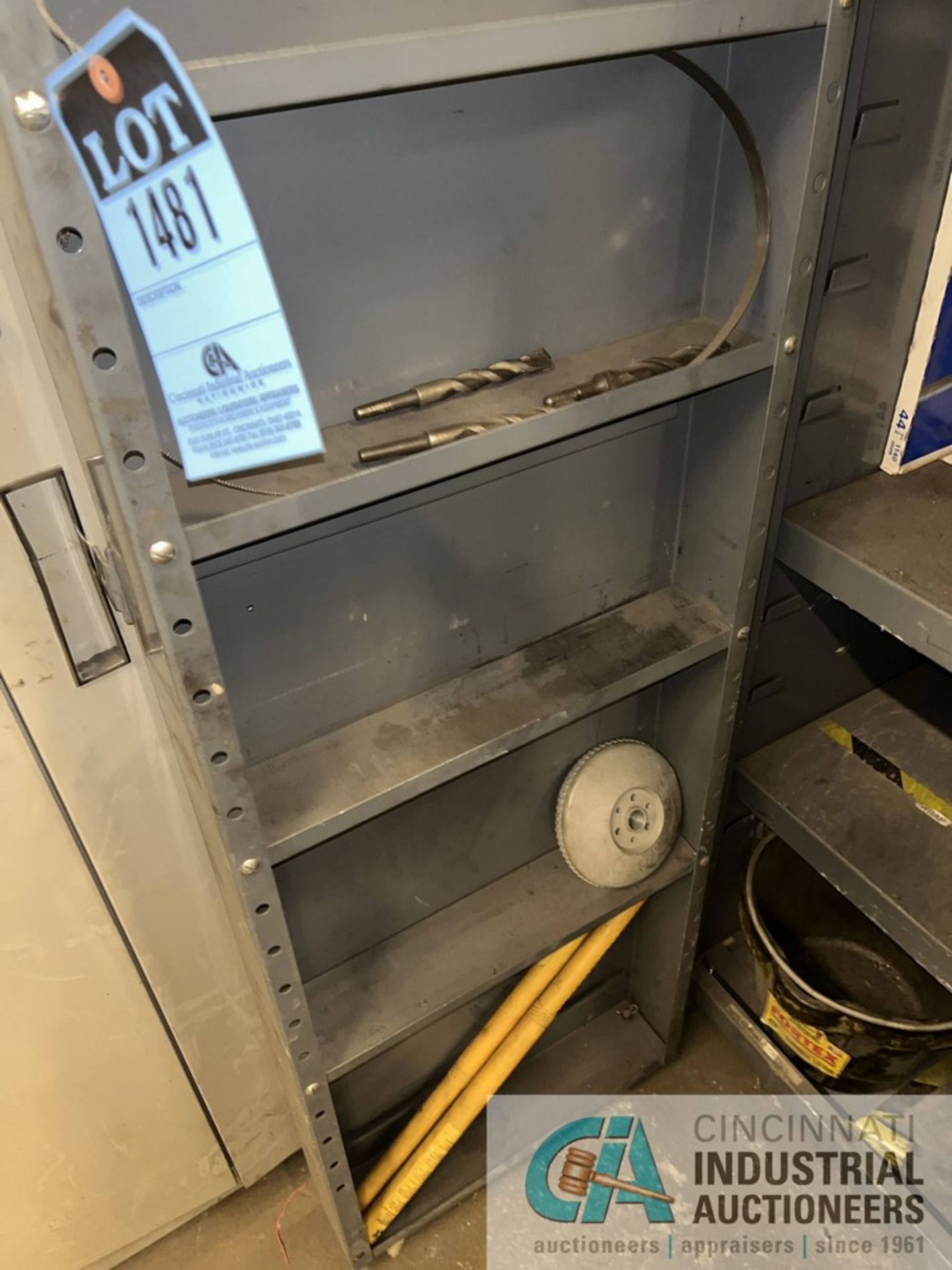 TWO-DOOR SHOP CABINET WITH CONTENTS; ROPE, DRILLS, STRAPS, BANDSAW BLADES