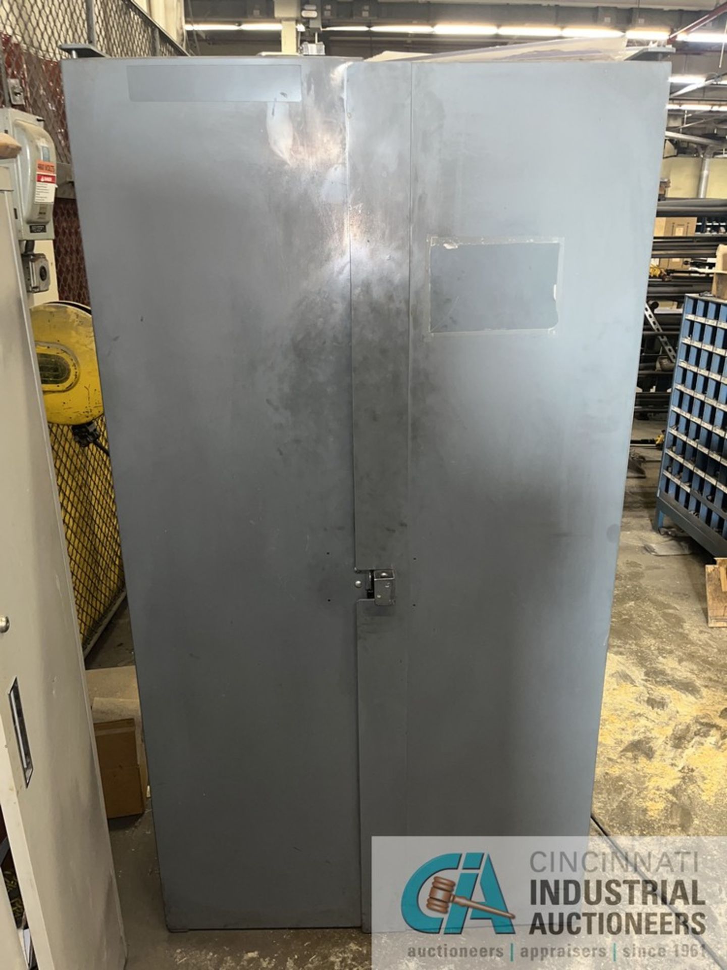 TWO-DOOR SHOP CABINET WITH CONTENTS; ROPE, DRILLS, STRAPS, BANDSAW BLADES