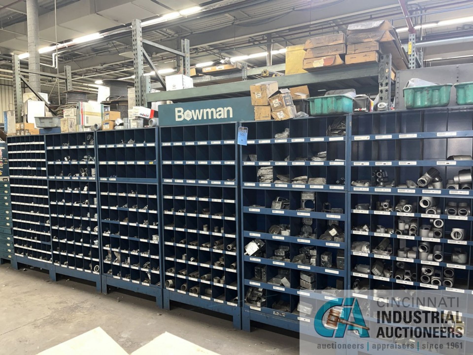 (7) SECTIONS OF STACKED STORAGE BINS WITH CONTENTS; ELECTRICAL PLUGS ...