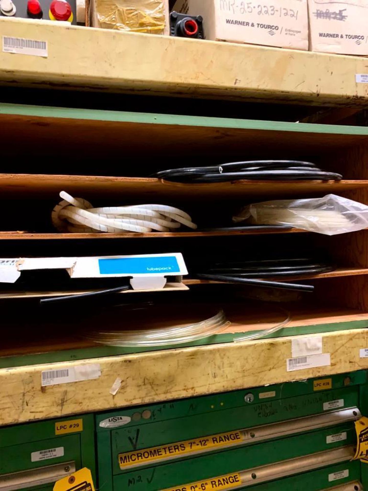 Content on (5) Bays of Speedrack: Gear Reducers, Sprockets, Hose ...