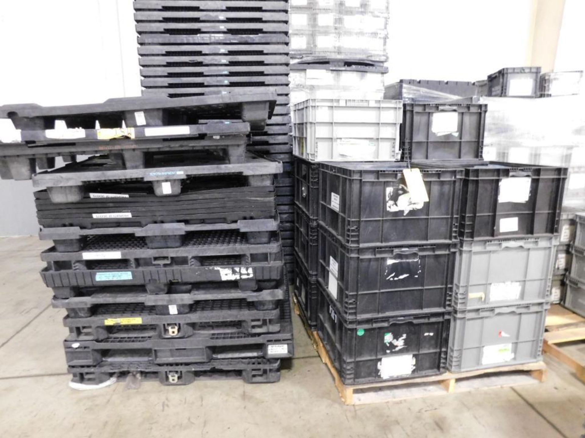 LOT: Large Quantity of Assorted Plastic Bins & Plastic Pallets