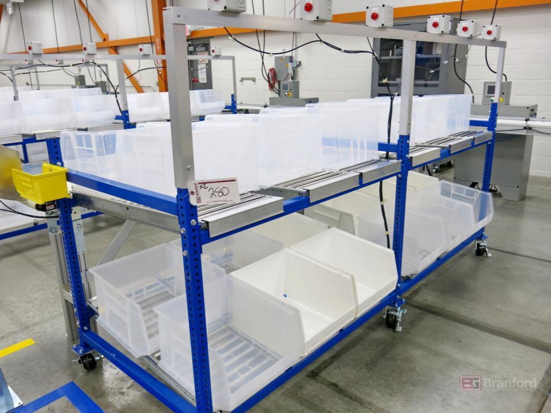 (2) Unex Span/Track 12-Station Castered Gravity Conveyors w/ Uline Arco ...