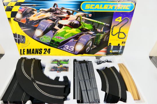 Scalextric - A boxed Le Mans 24 set # C1114. The contents including MG ...