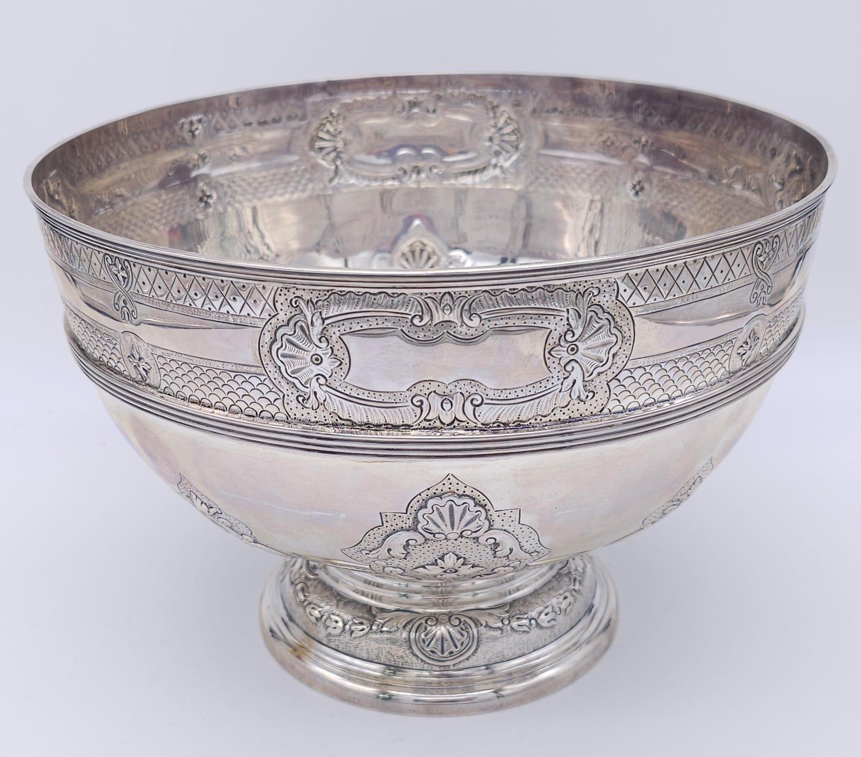 AN ANTIQUE SILVER PUNCH BOWL HAND DECORATED BY A TOP SILVERSMITH IN ...