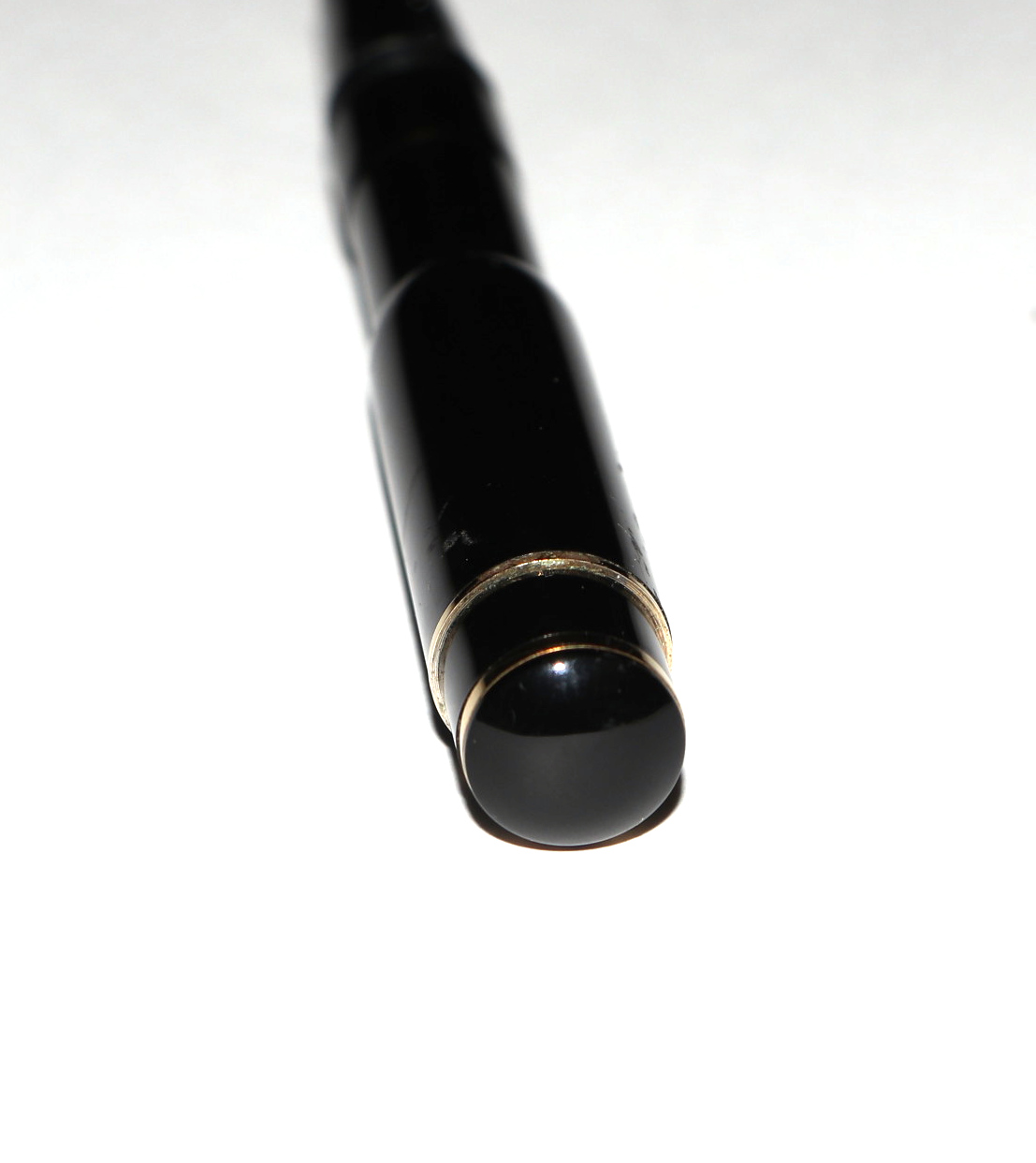 A black lacquer and gilt metal fountain pen with iridium point nib ...